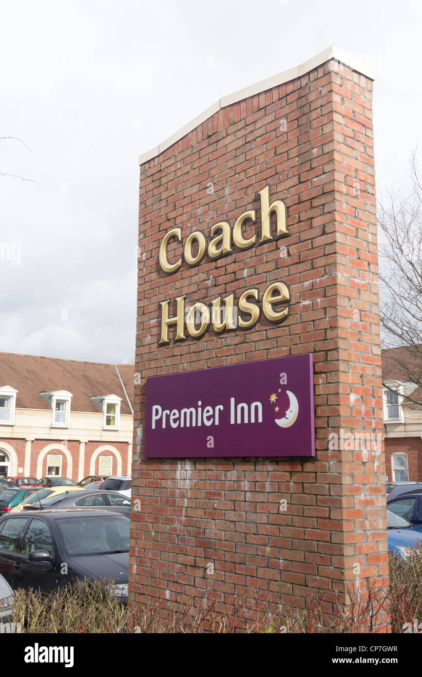 Sign for the 'Coach House' Premier Inn hotel adjacent to the Trafford ...