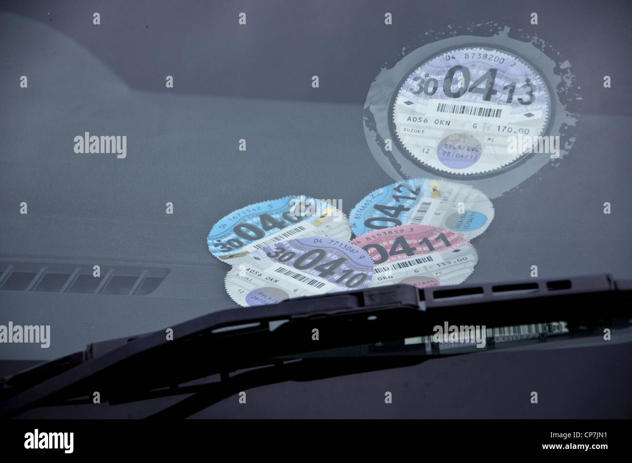 Tax disc in car windscreen Stock Photo - Alamy