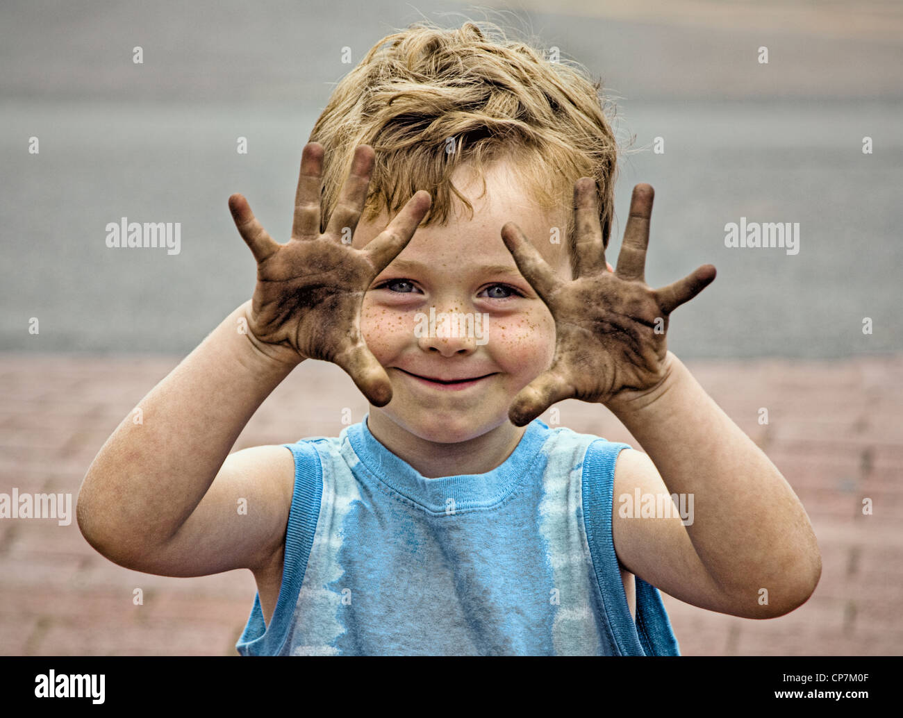 Boy with dirty hands Stock Photo - Alamy