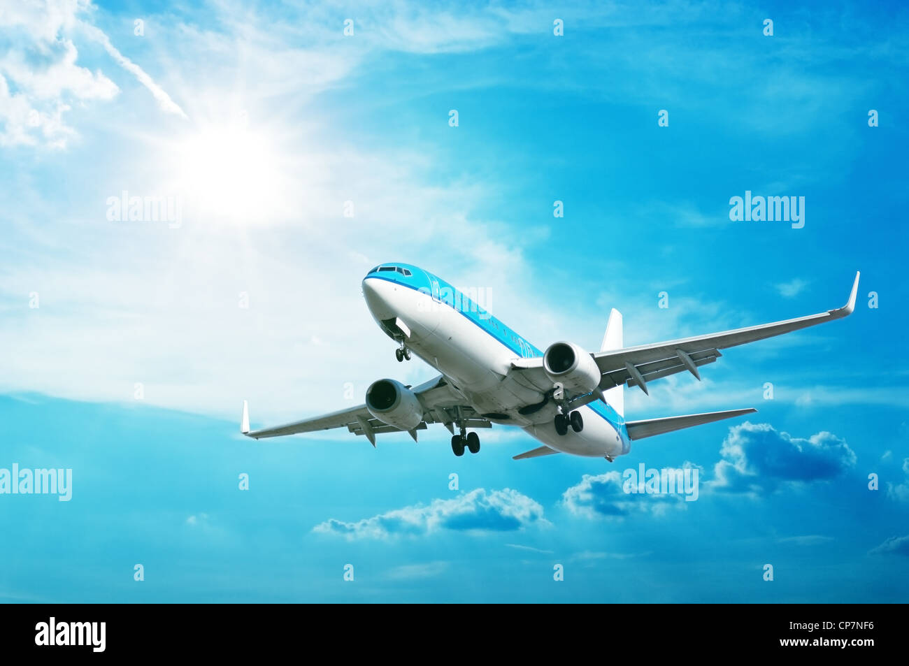Airplane flying in the air Stock Photo - Alamy