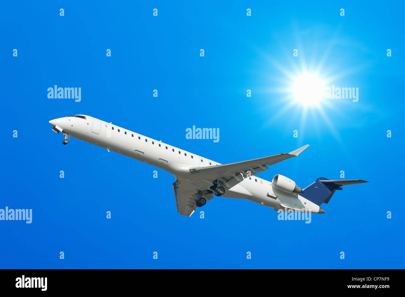 Airplane flying in the air Stock Photo - Alamy