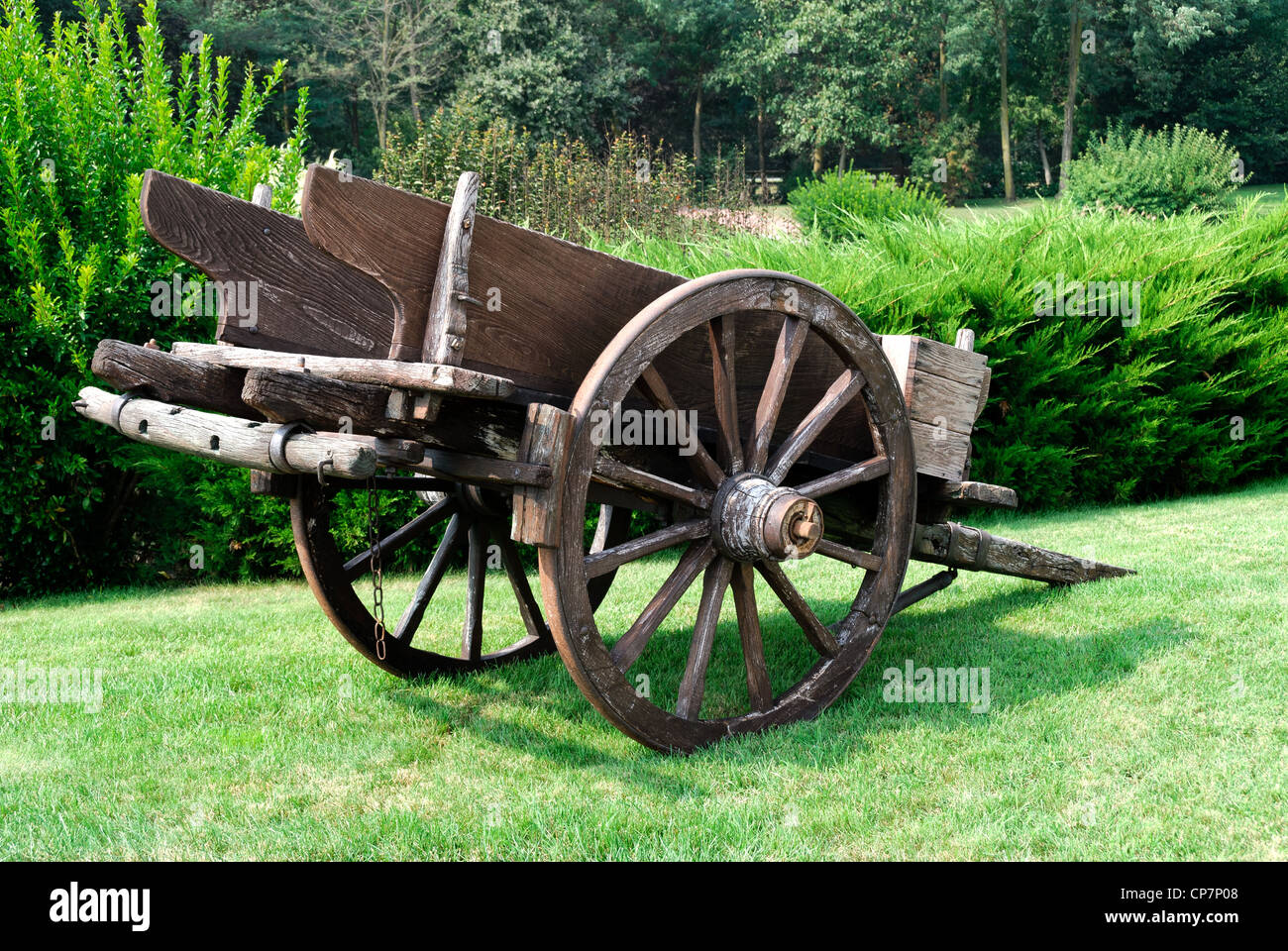 Ancient wooden cart in a park Stock Photo - Alamy