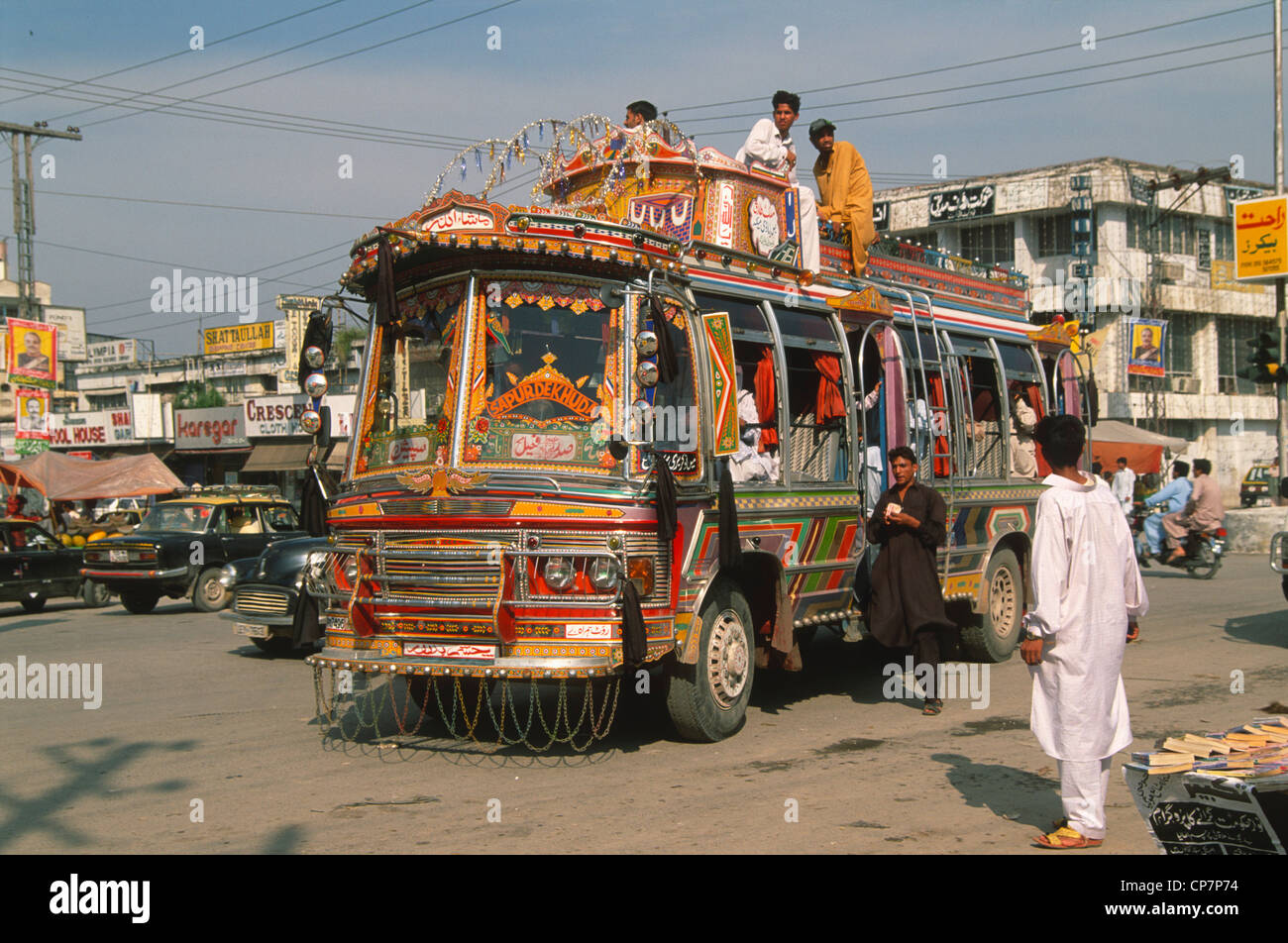 Pakistan, Punjab, Rawalpindi, street scene, bus, traffic, people Stock ...