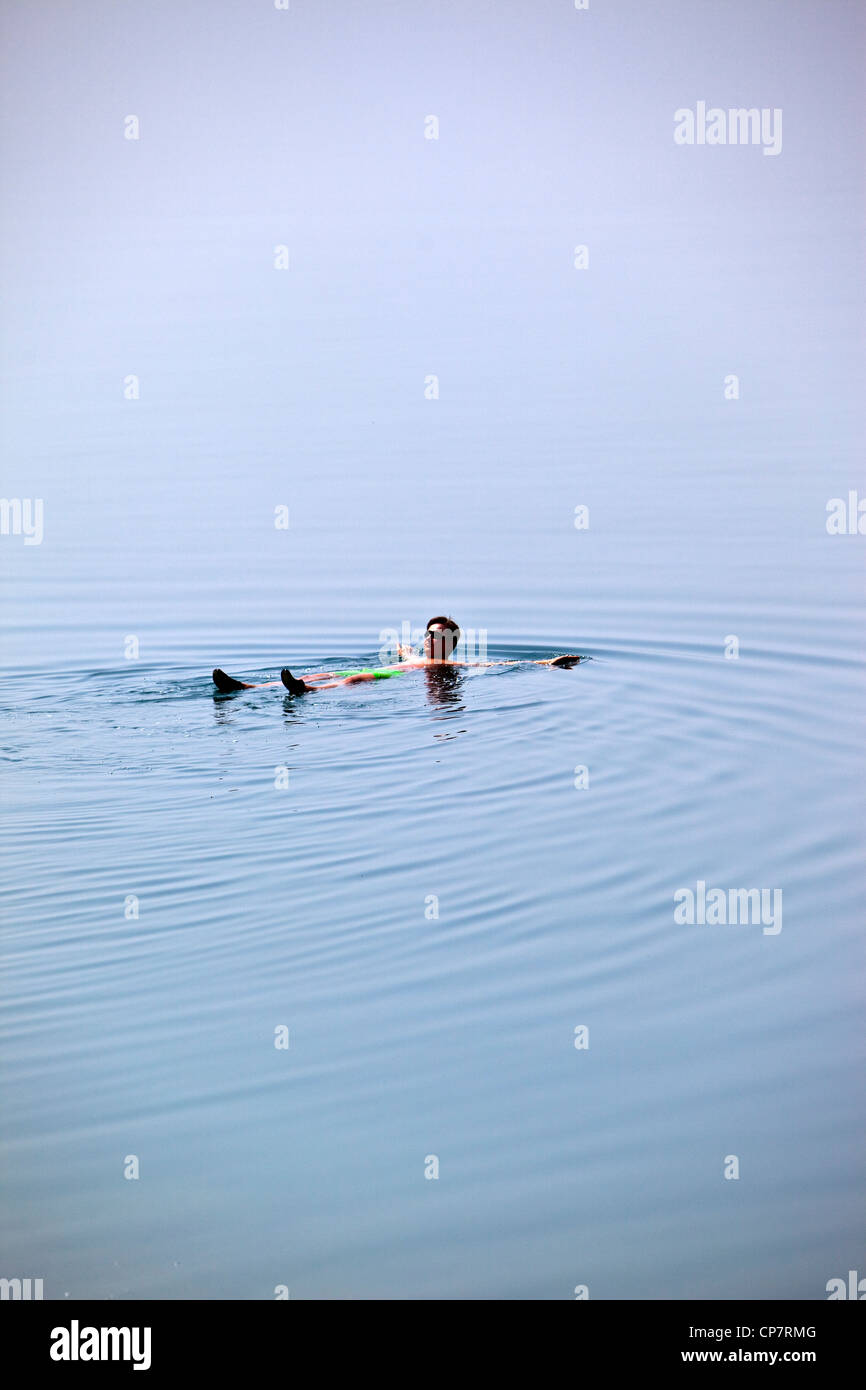 Man floating in Dead Sea, Movenpick Resort Hotel, Jordan, Western Asia ...