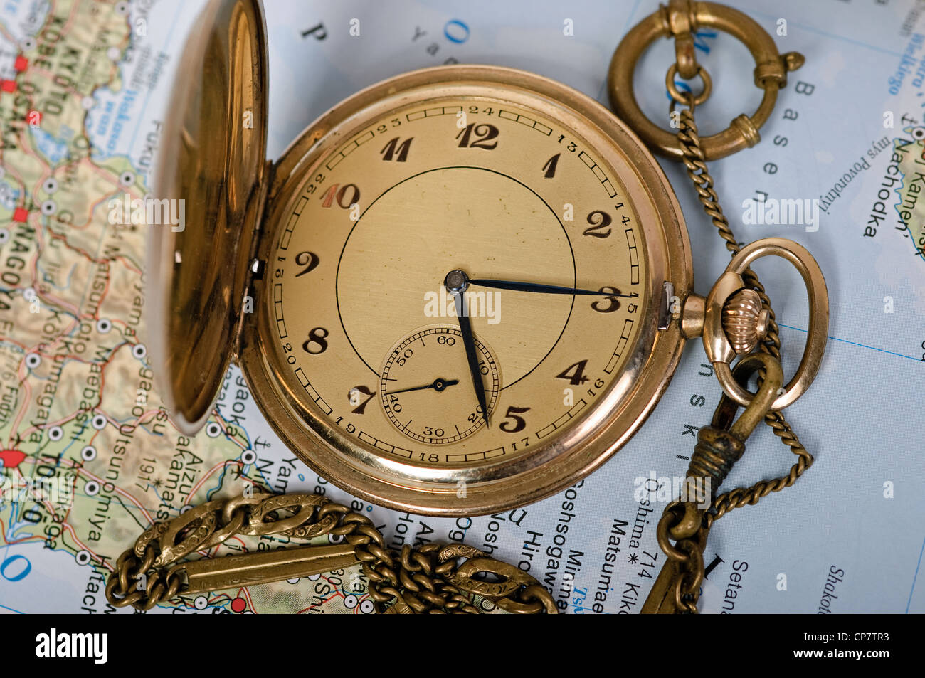 Photo of old watch on map Stock Photo - Alamy