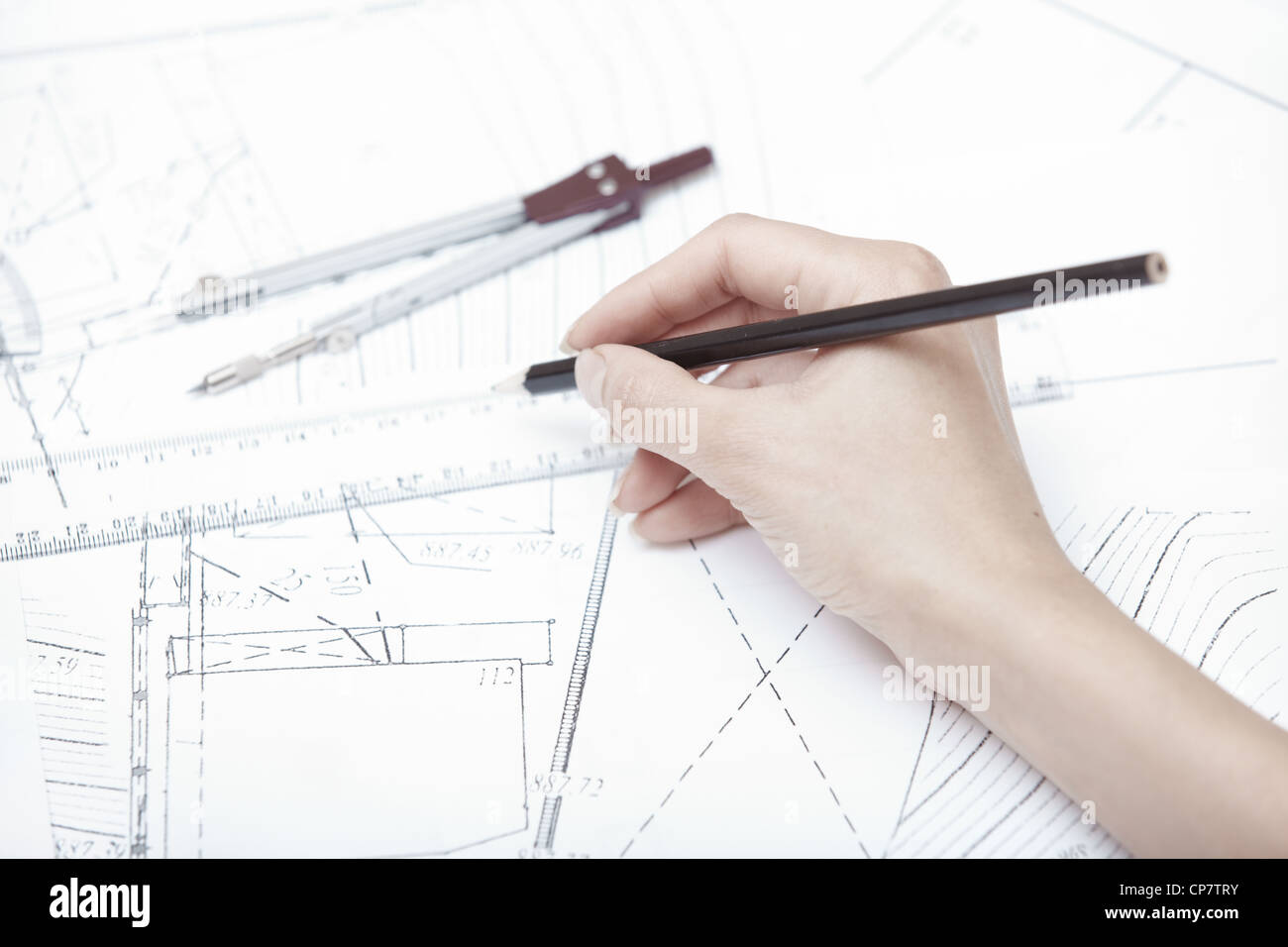 Hands of engineer working on a construction plan Stock Photo - Alamy