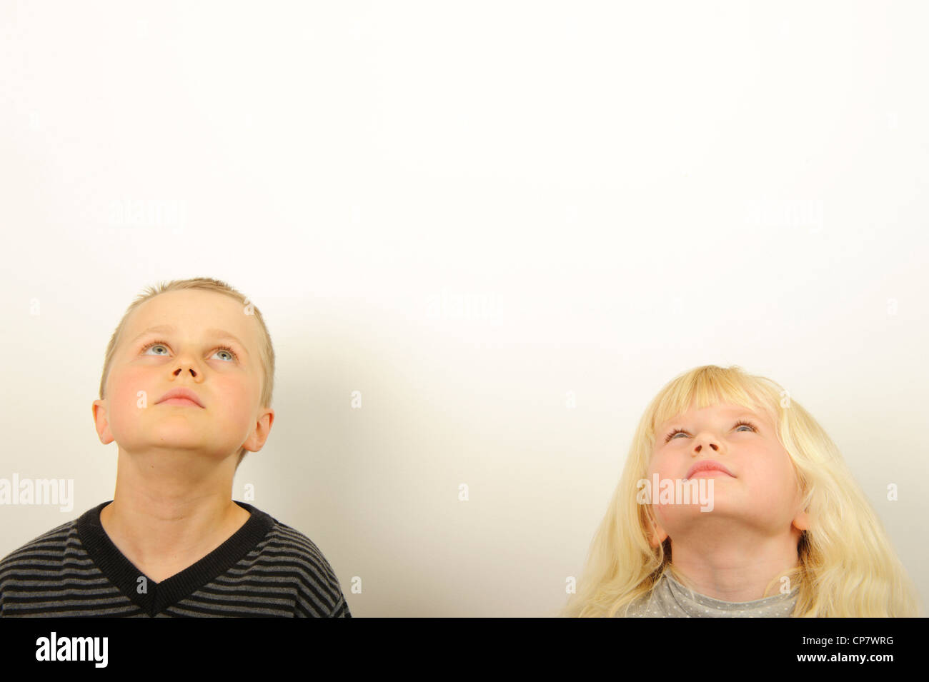 Stock Photo of two children looking up Stock Photo - Alamy