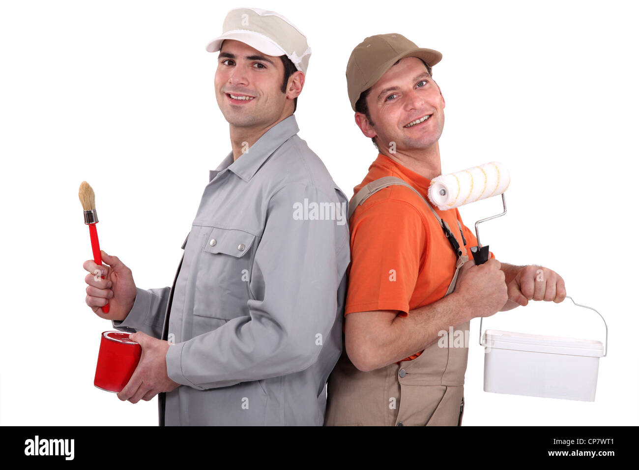 Two painters back to back, studio shot Stock Photo - Alamy
