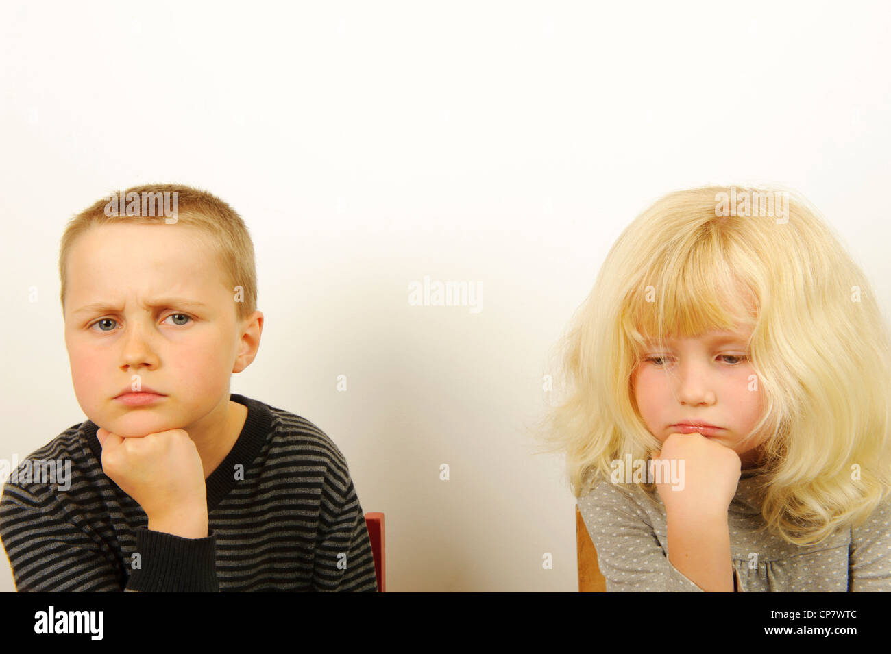 Stock Photo of two children thinking Stock Photo - Alamy