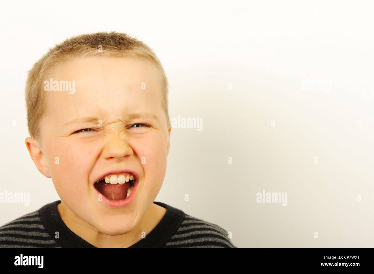 Stock Photo of a young boy shouting Stock Photo - Alamy