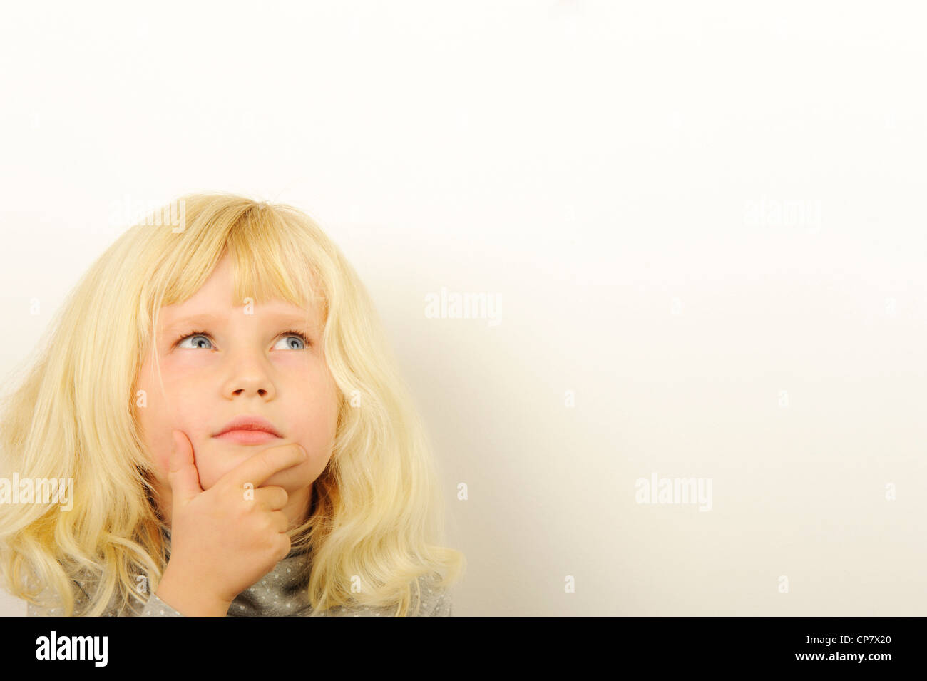 Stock Photo of child thinking Stock Photo - Alamy