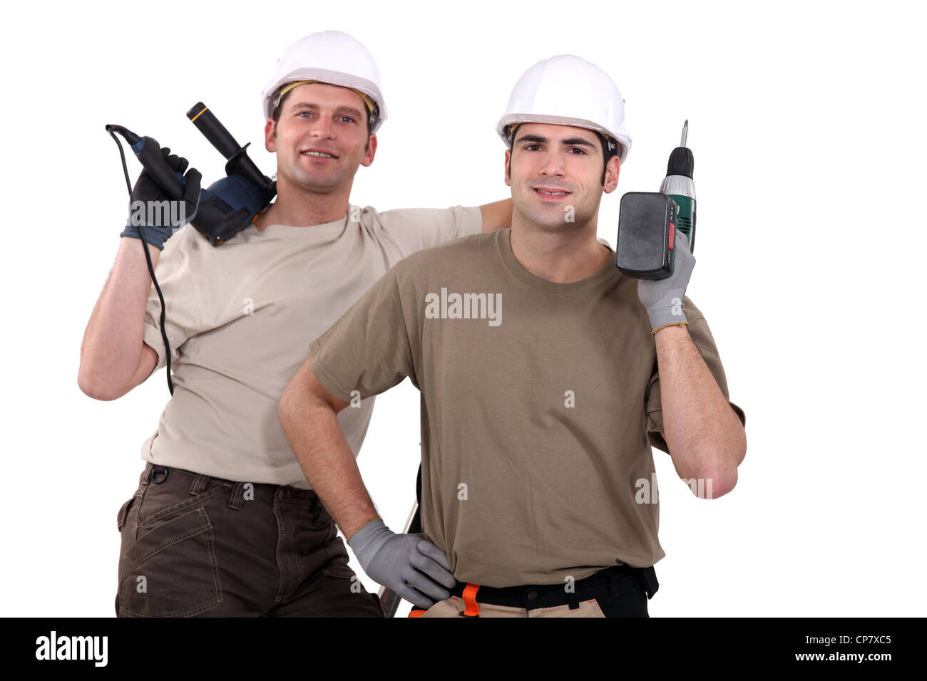 Manual workers with power tools Stock Photo - Alamy