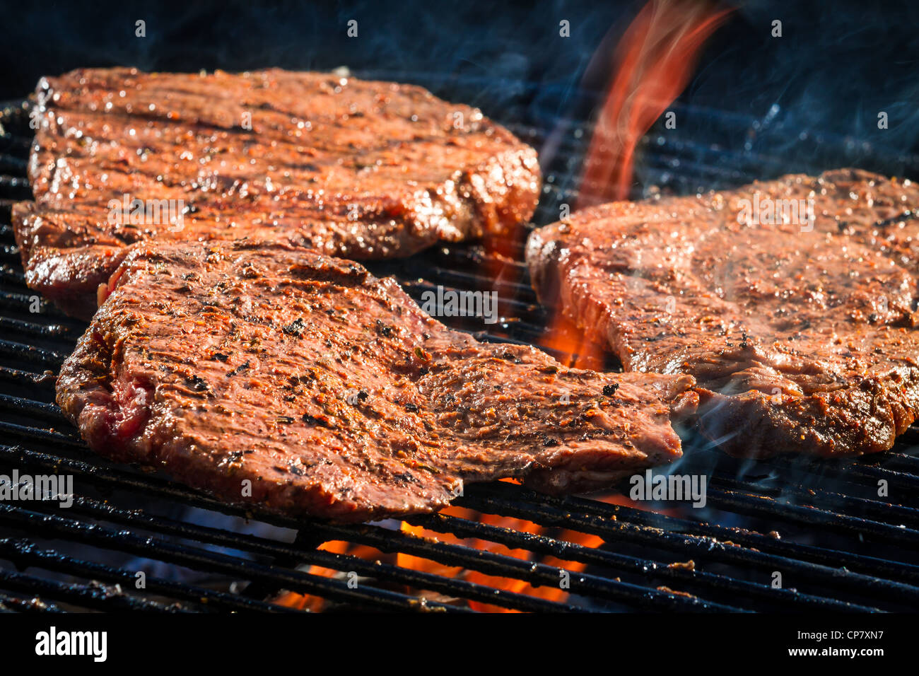 Roast steak beaf on grill Stock Photo - Alamy