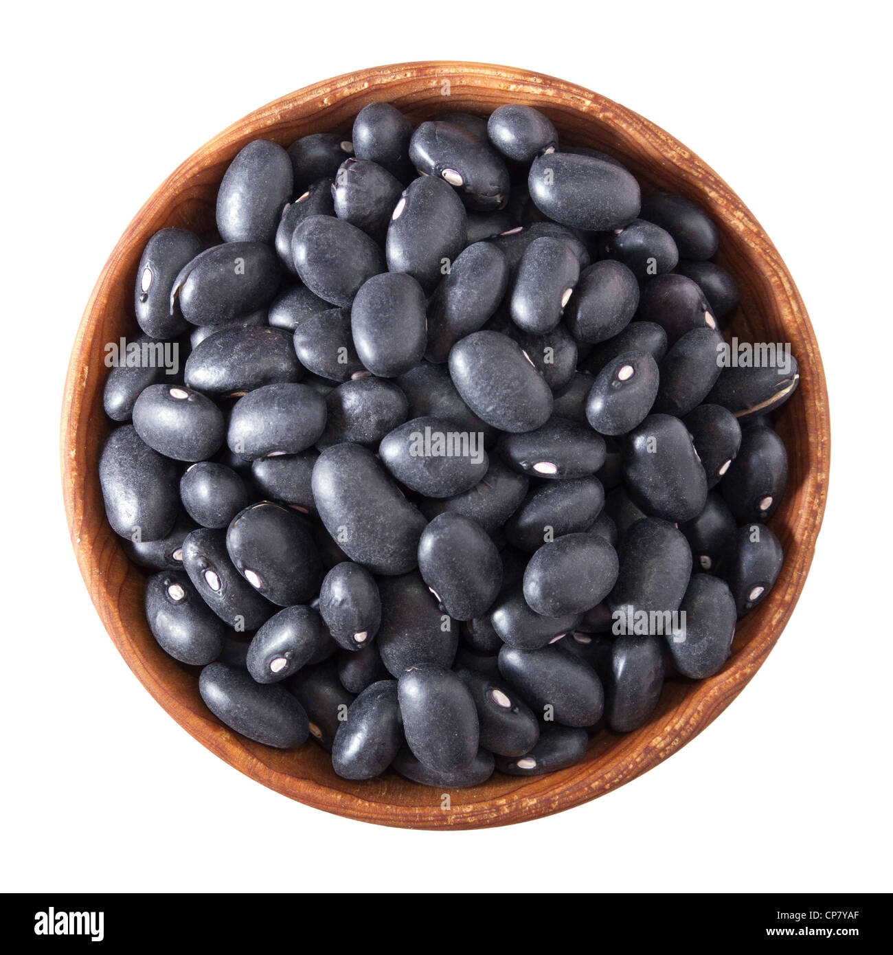 wooden bowl full of black small beans isolated on white background ...