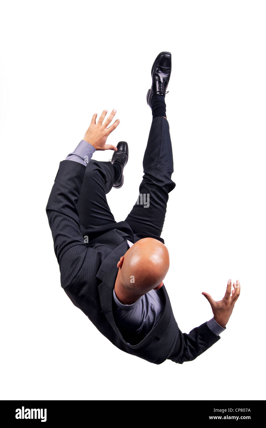Businessman falling isolated in white Stock Photo - Alamy