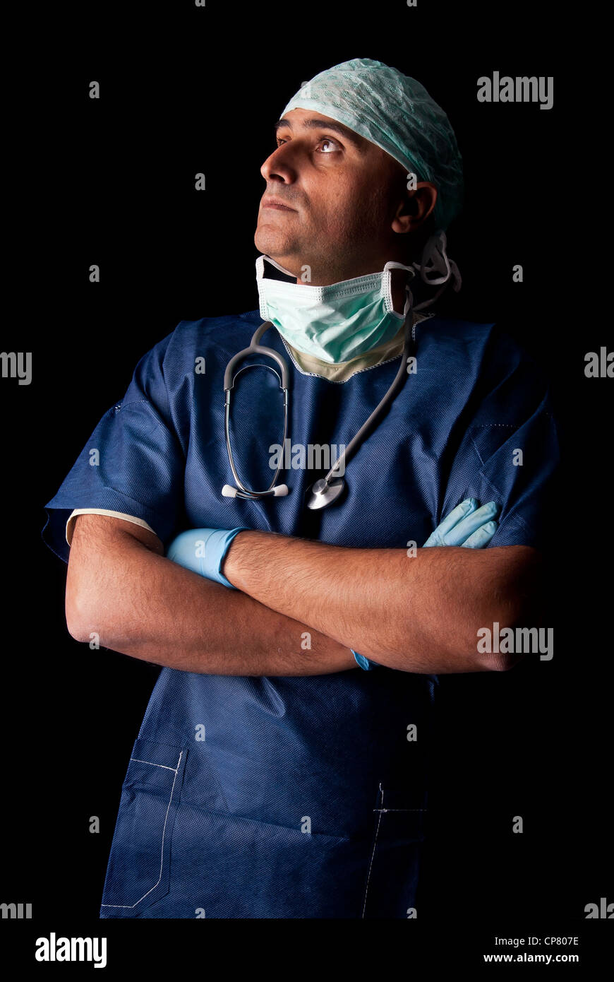 Doctor in a dark background Stock Photo - Alamy