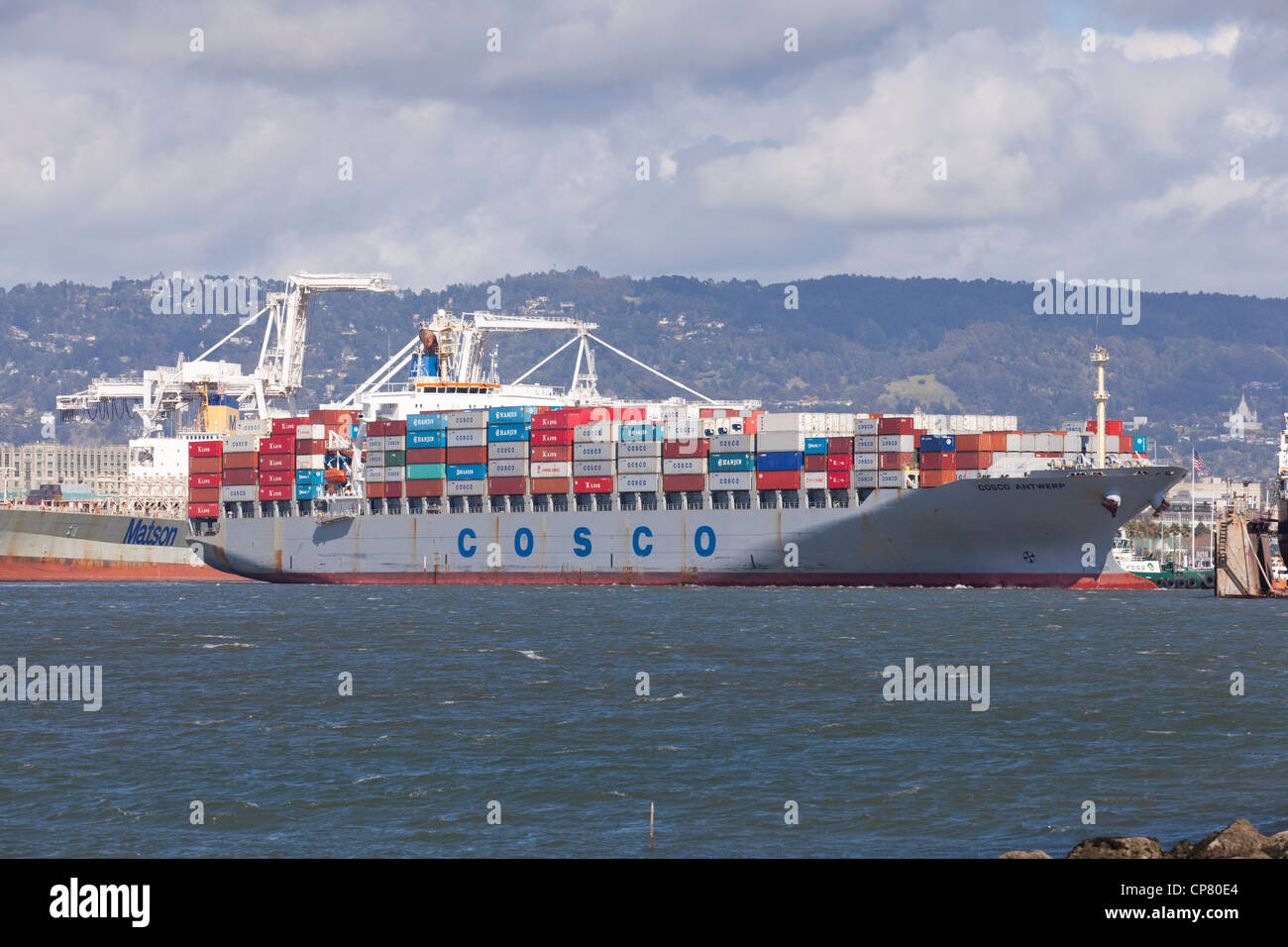 A fully loaded Cosco container ship at port - San Francisco, California ...