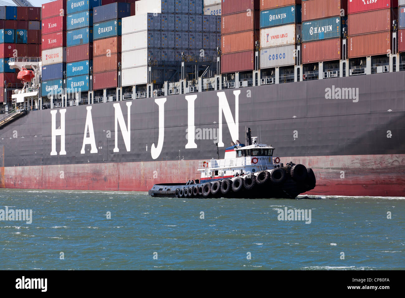 Hanjin shipping container ship, flagged by a tugboat, entering port of ...