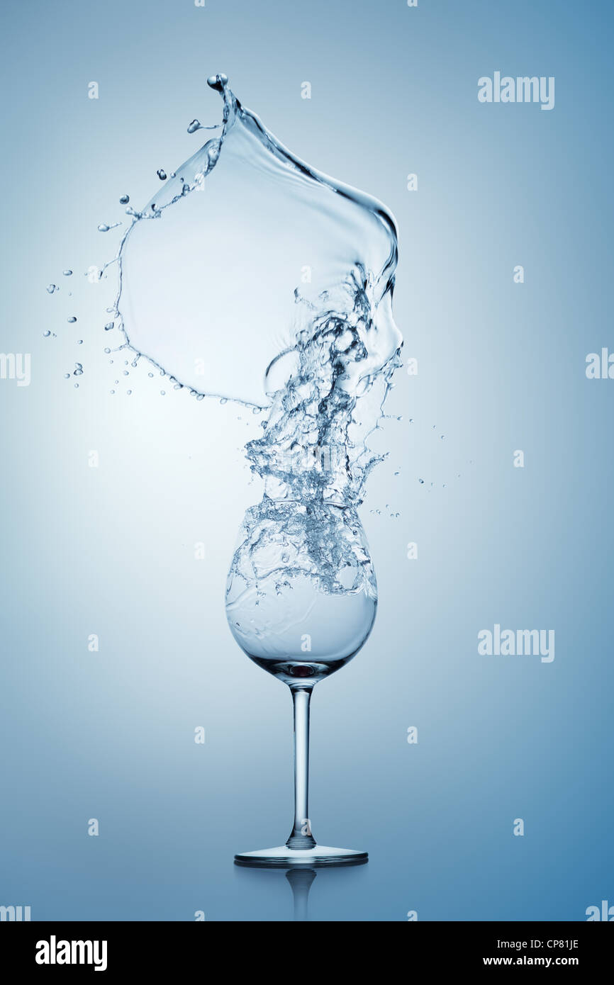 Water Splash in Wine Glass Stock Photo - Alamy