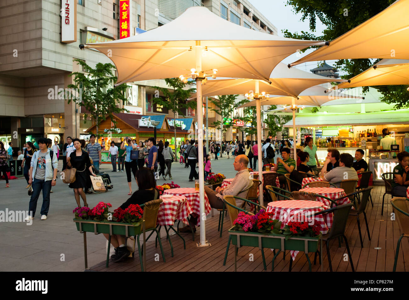 People have rest in a open bar, Wangfujing commercial street in Beijing ...