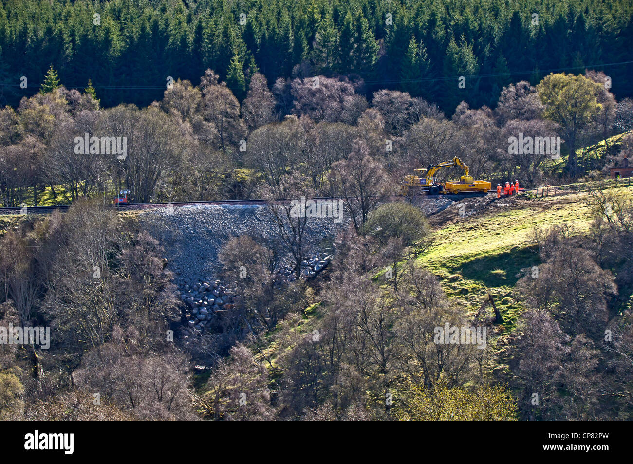 Contractors putting ballast after repairing the trackbed north of ...
