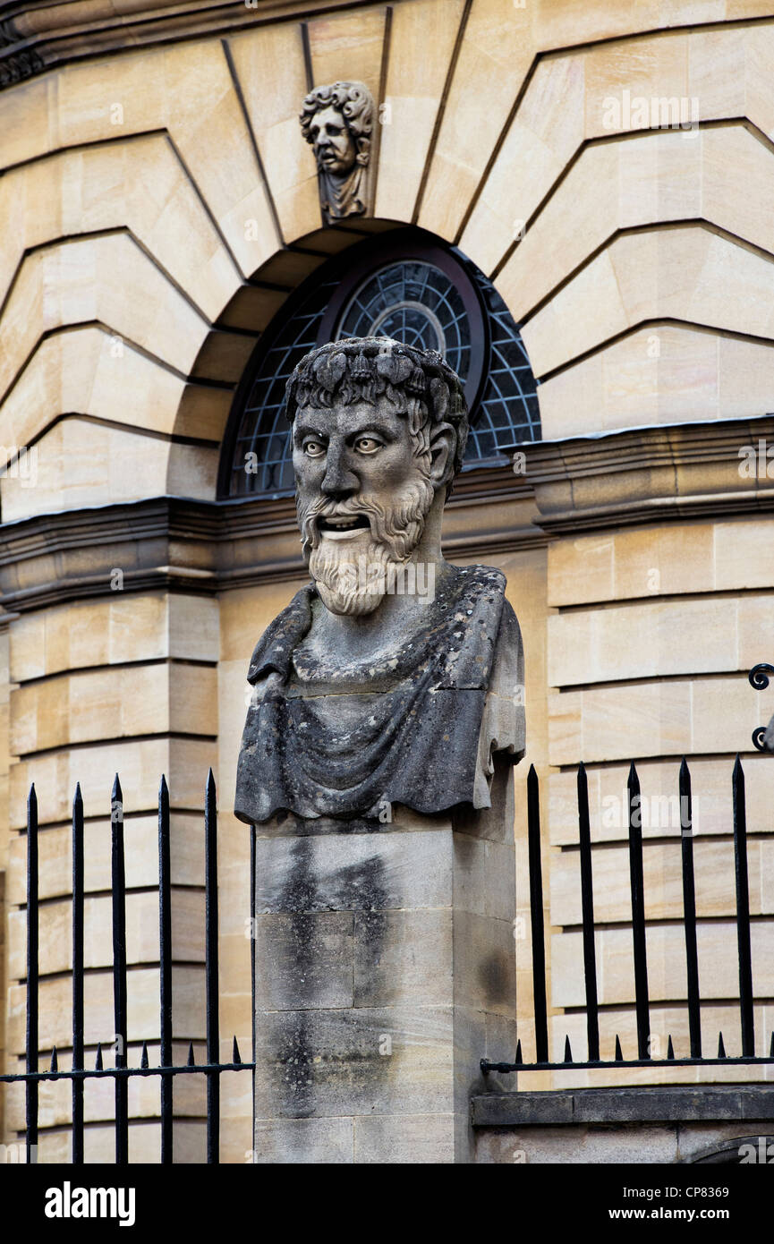 Carved stone bust on a plinth outside Sheldonian theatre, Oxford ...