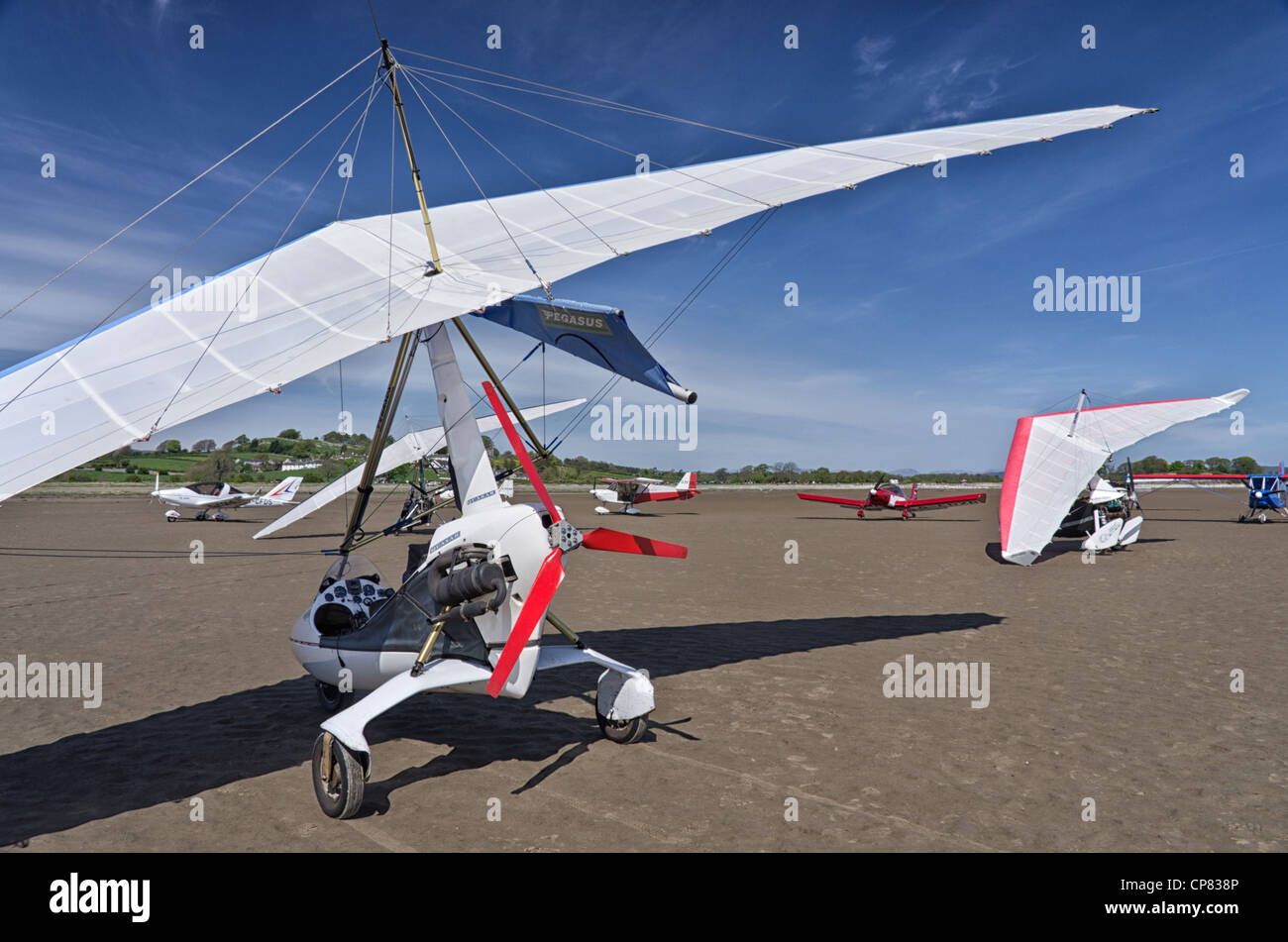 Microlight aircraft and small aircraft club meeting on the beach at ...