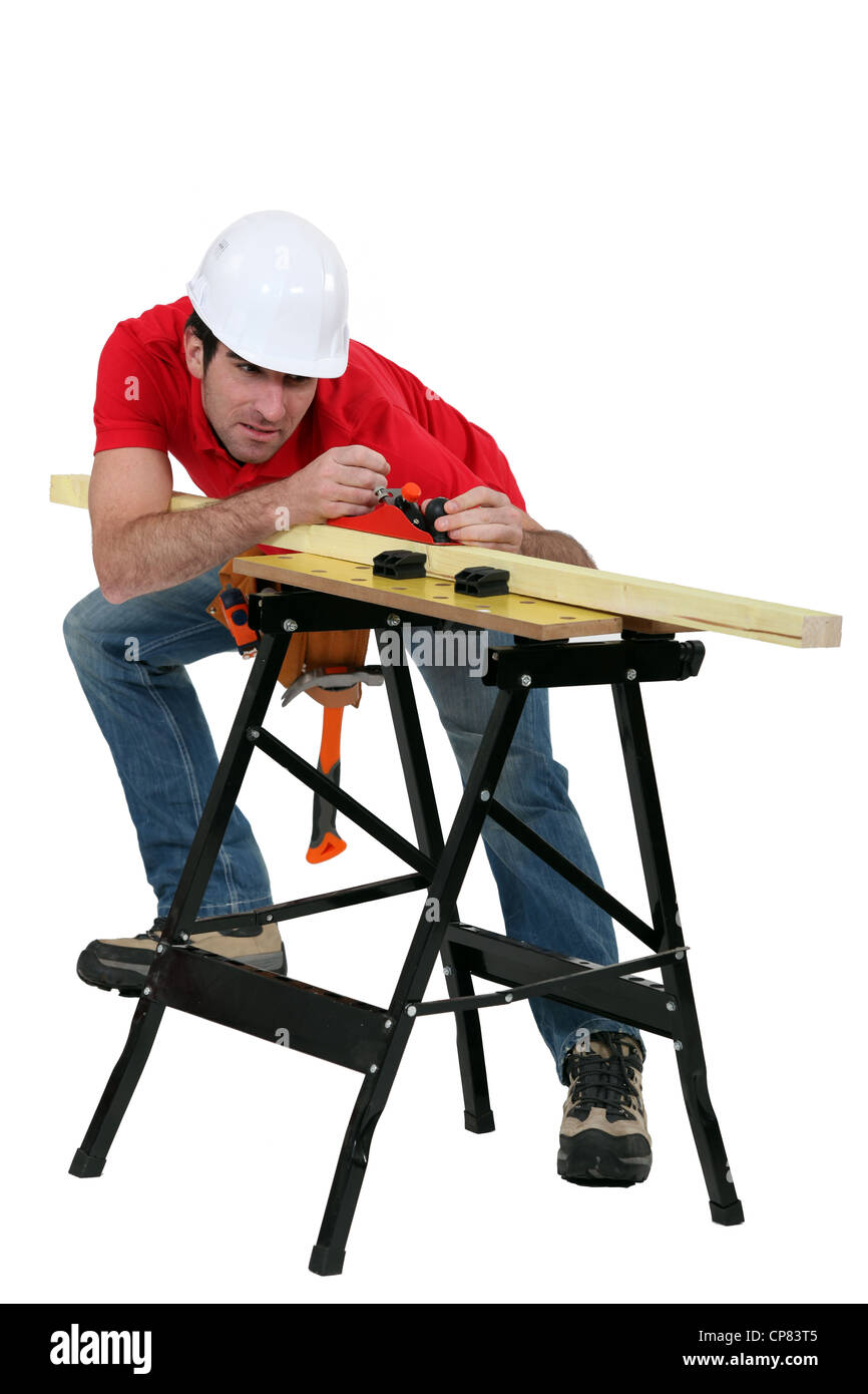 Man measuring wood Stock Photo - Alamy