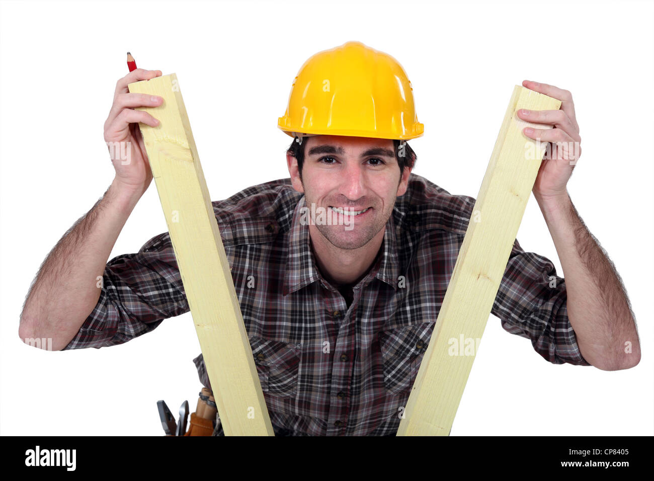 Man between two planks of wood Stock Photo - Alamy