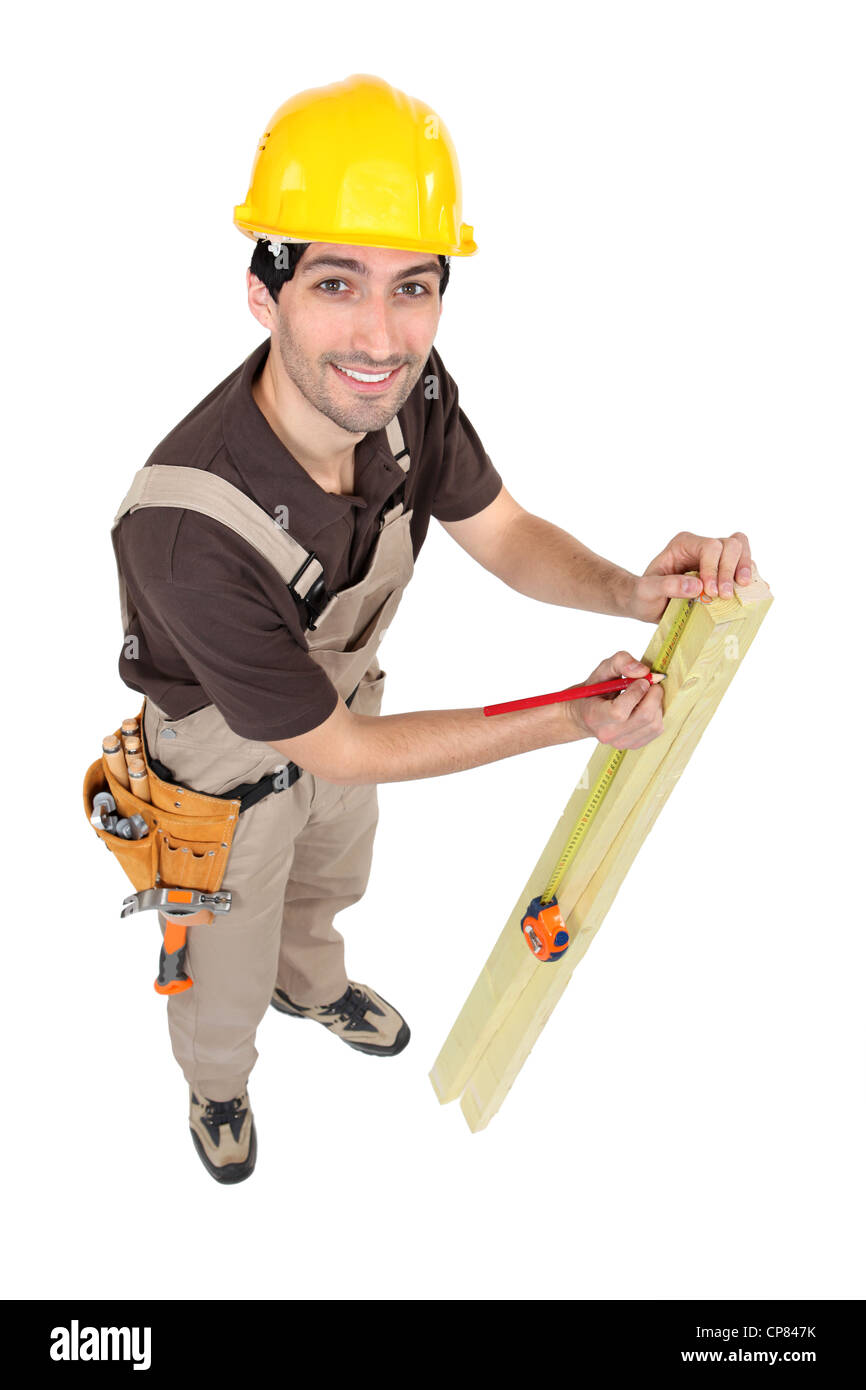 Carpenter marking wood Stock Photo - Alamy