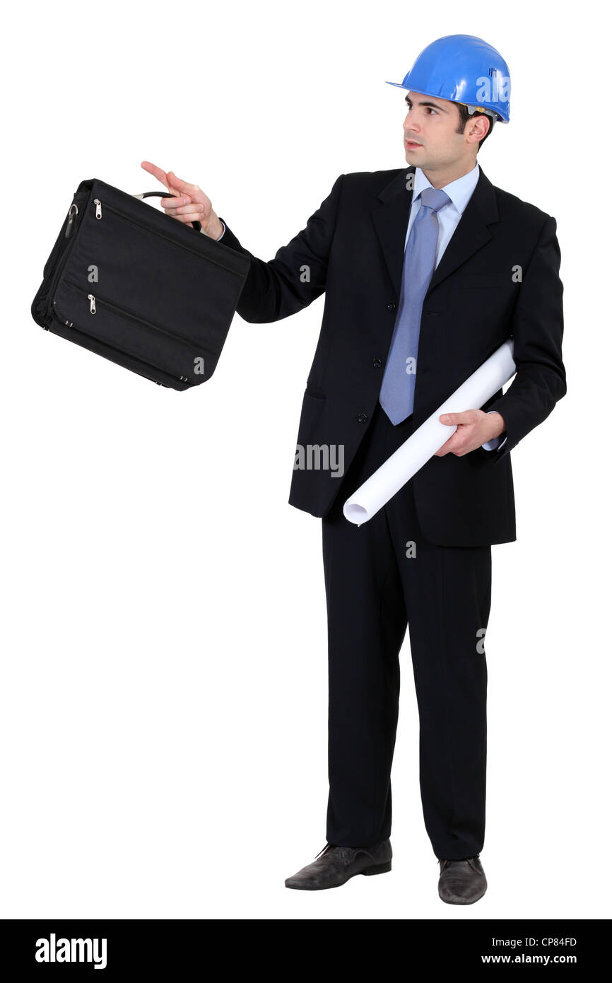 Engineer holding a briefcase and blueprint Stock Photo - Alamy