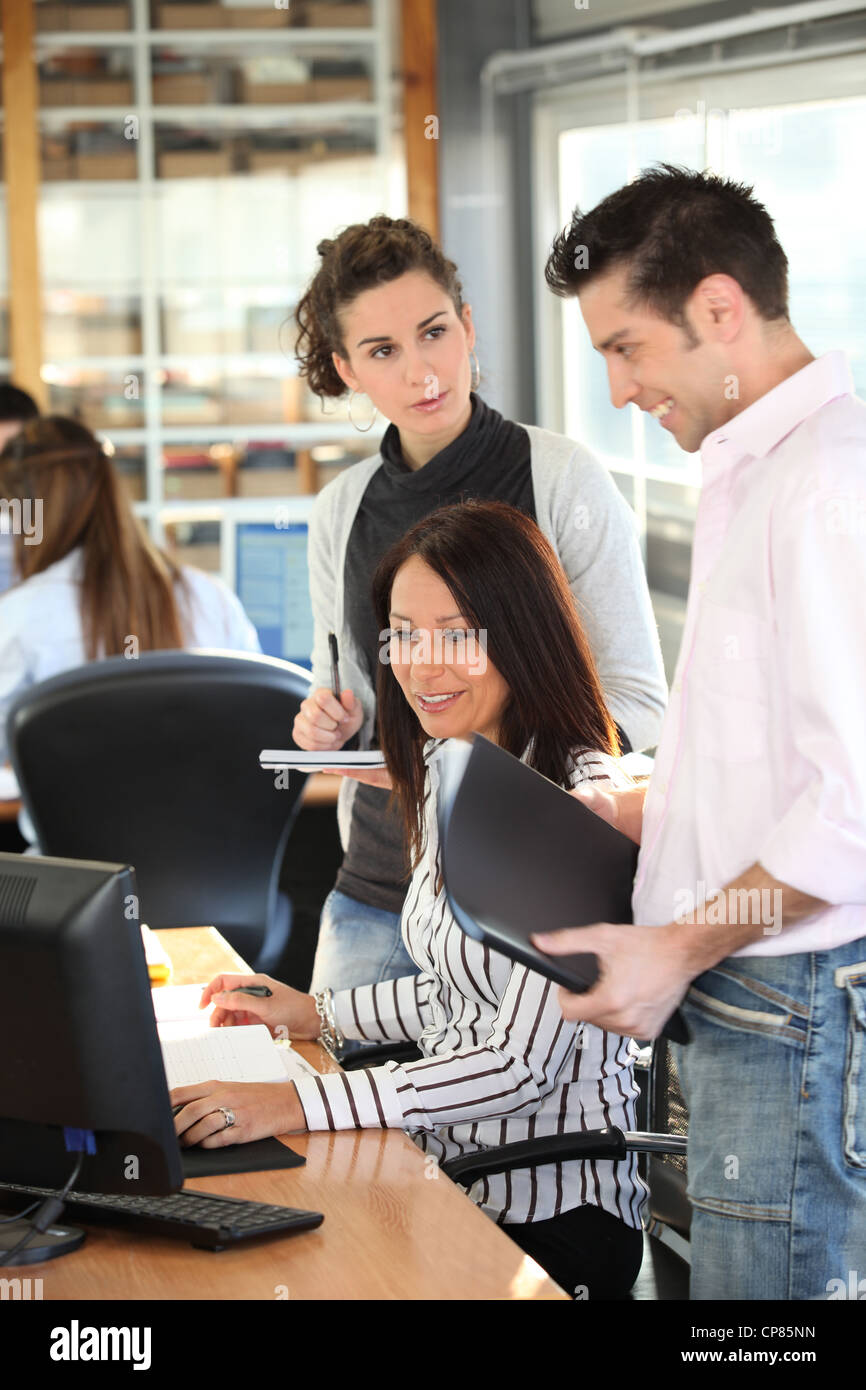 Sales team in office Stock Photo - Alamy