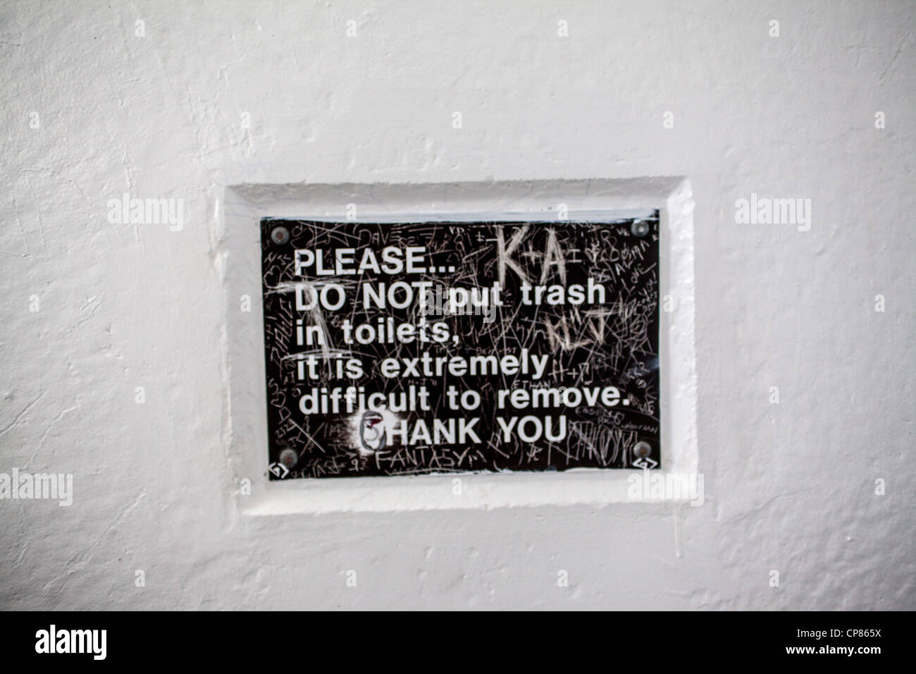 A Warning sign in the bathroom at Goat Rock State beach in California ...