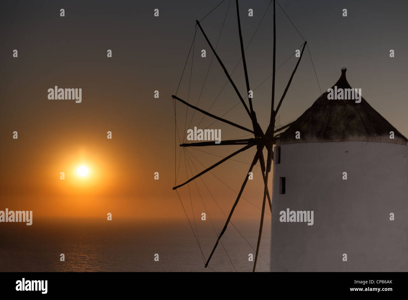Santorini sunset windmill greece hi-res stock photography and images ...