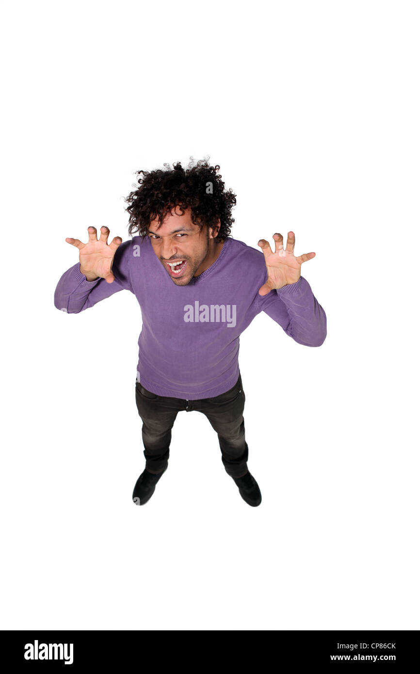 Man making scary face Stock Photo - Alamy