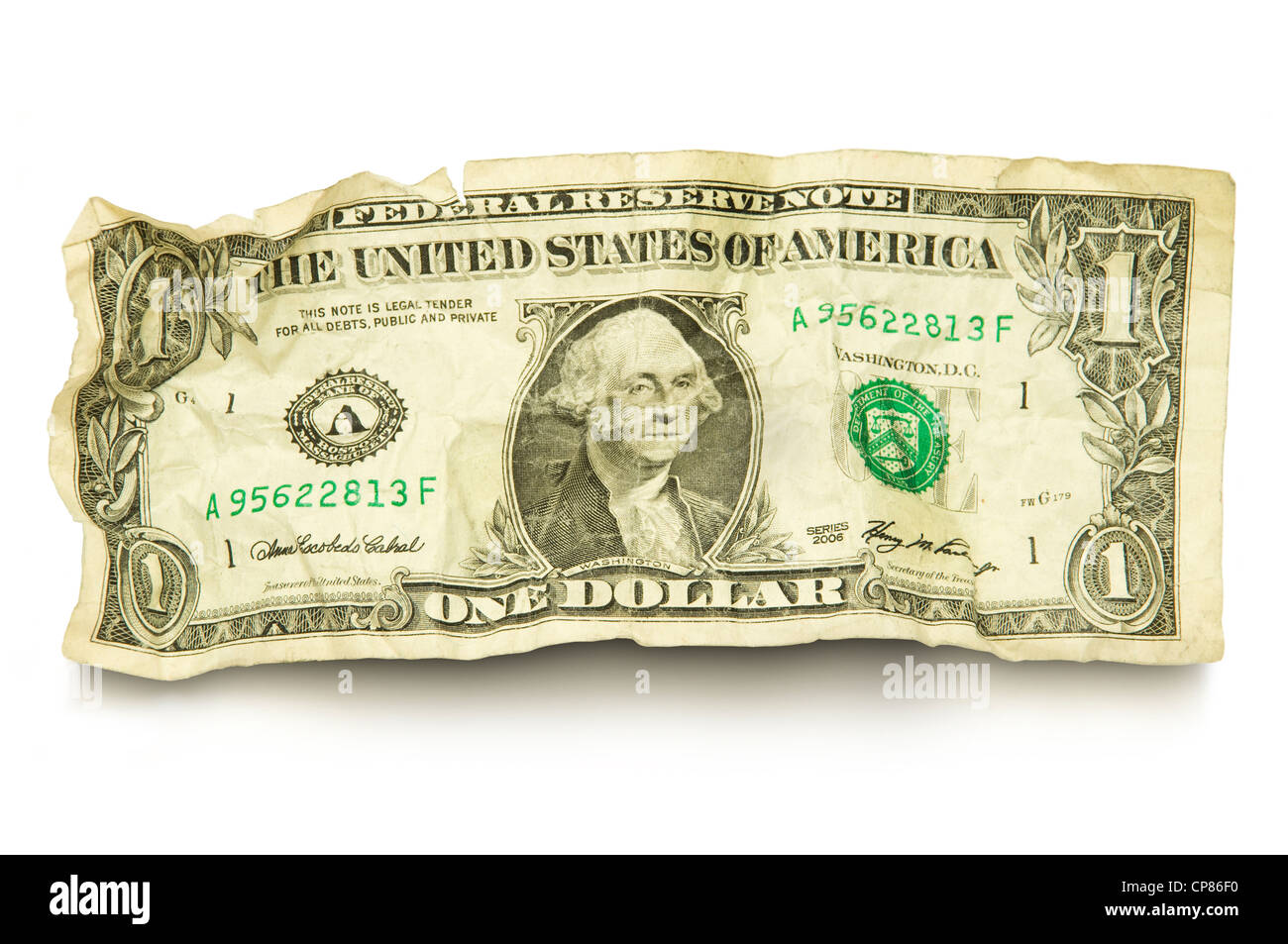 Single crumpled dollar bill against white background Stock Photo - Alamy
