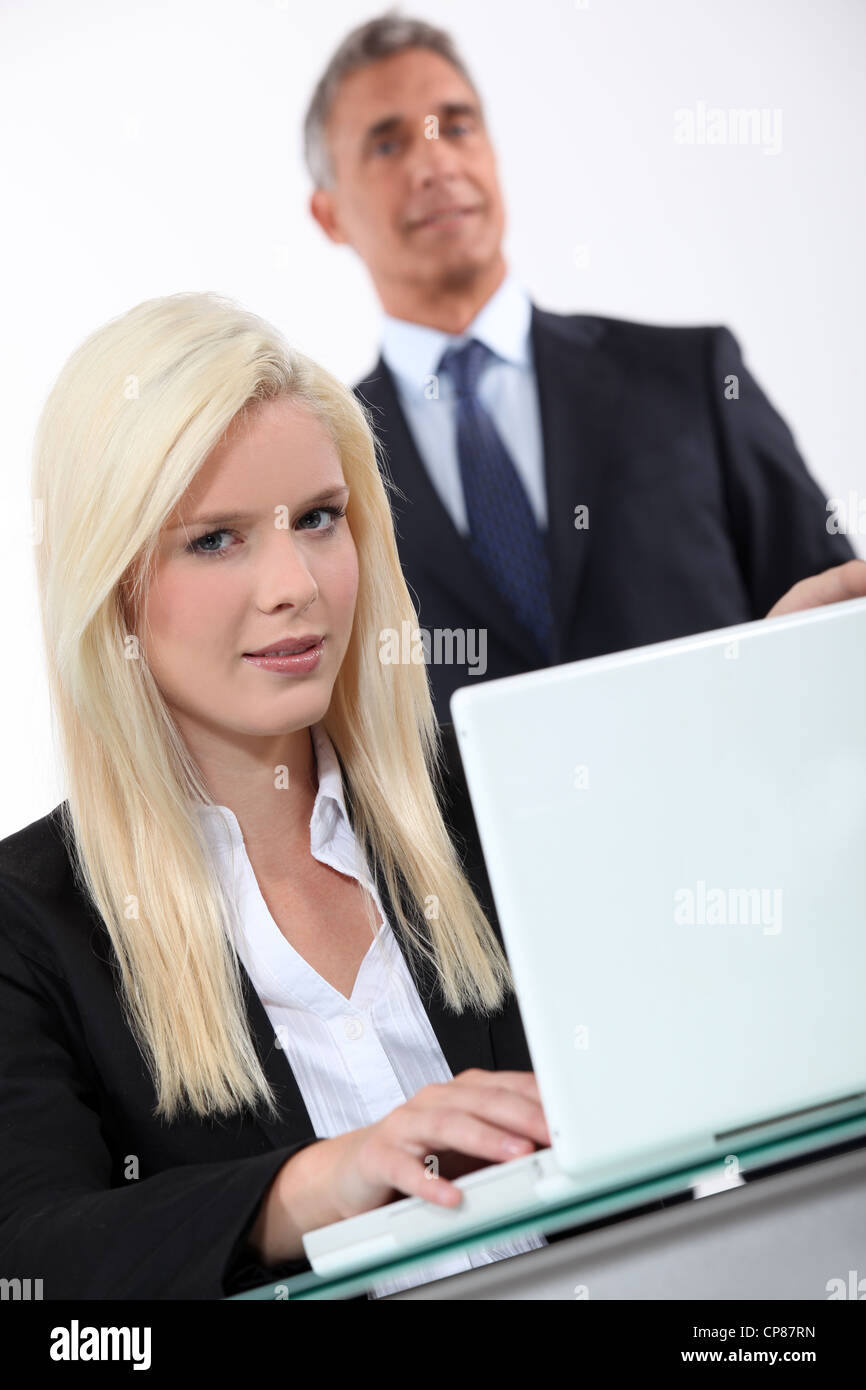 Man approaching blond woman Stock Photo - Alamy