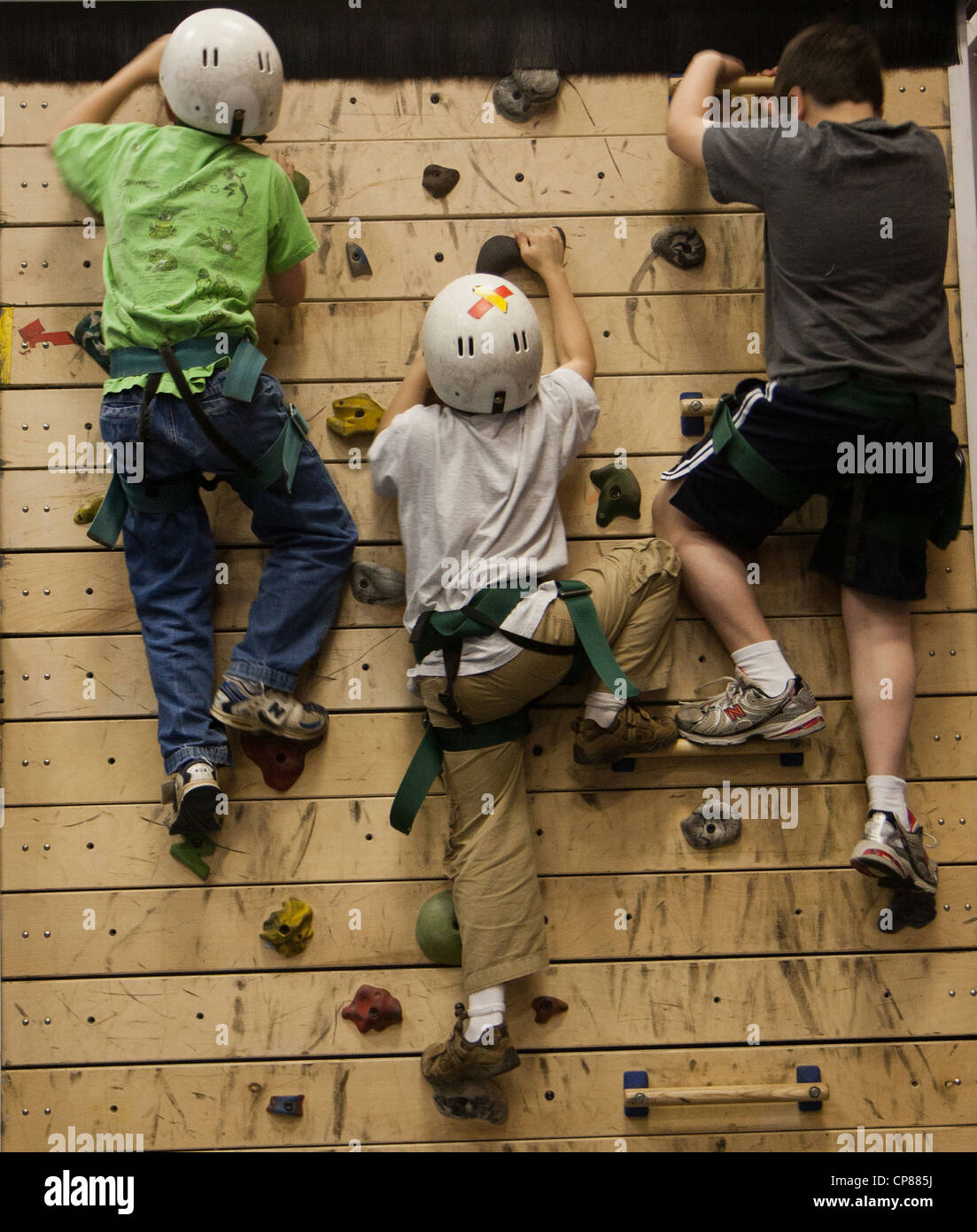 boys climbing rock Stock Photo - Alamy