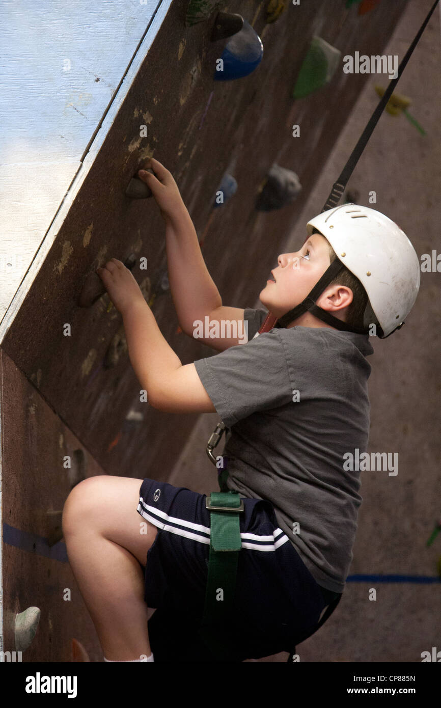 boy climbing wall Stock Photo - Alamy