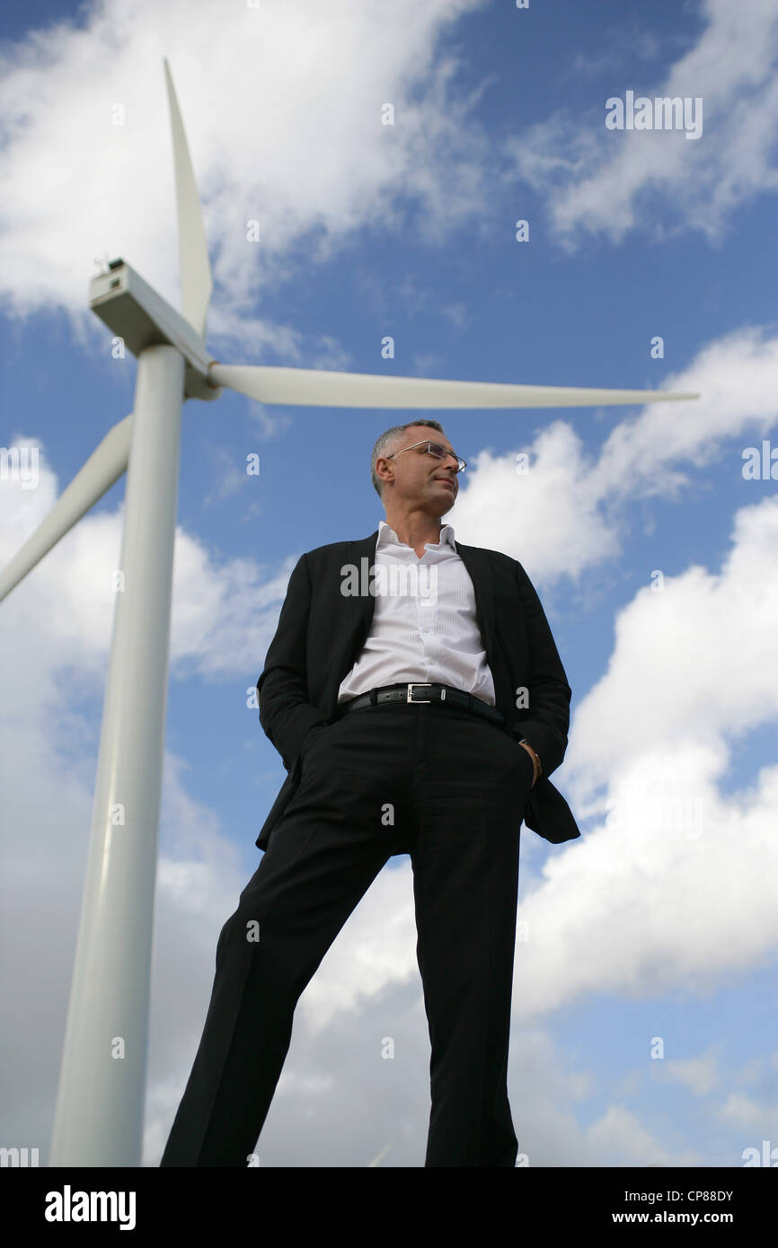 Man and windmill Stock Photo - Alamy