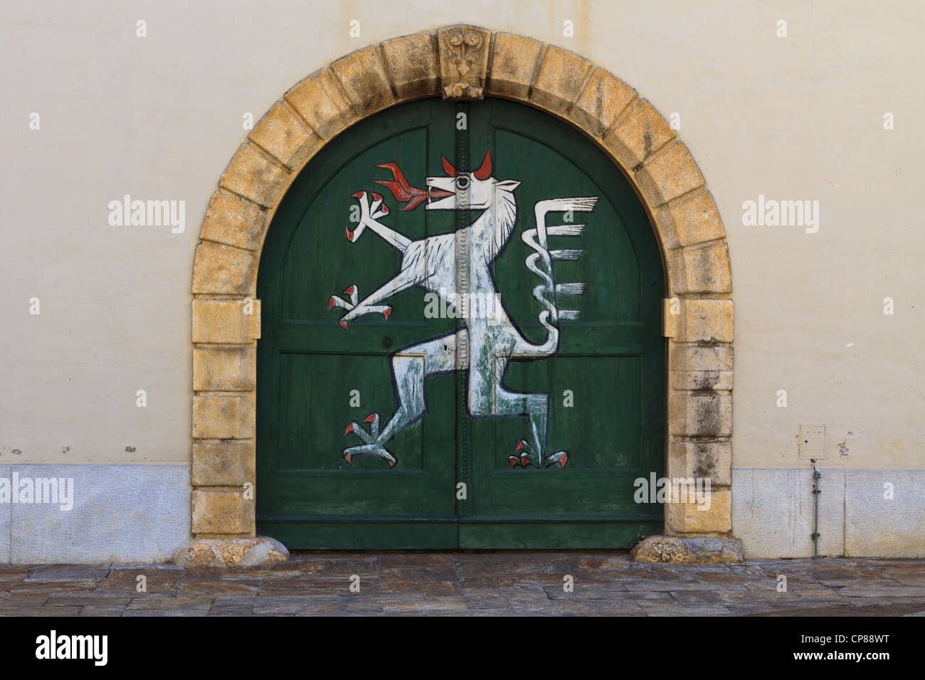 Styria's (Austria) heraldic dragon on a door in a municipal building in ...