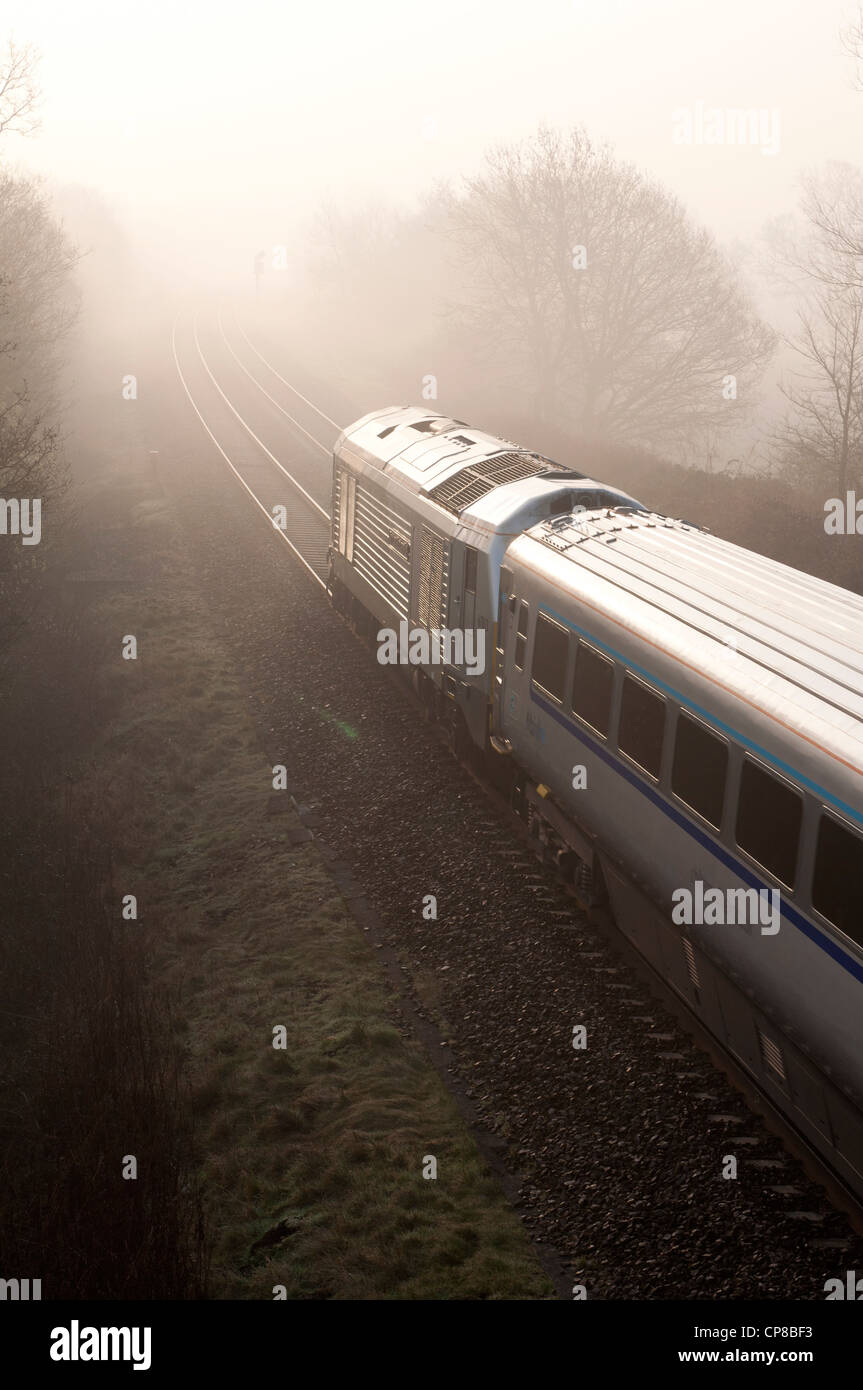 Chiltern Railways Mainline train in fog, Warwickshire, UK Stock Photo ...