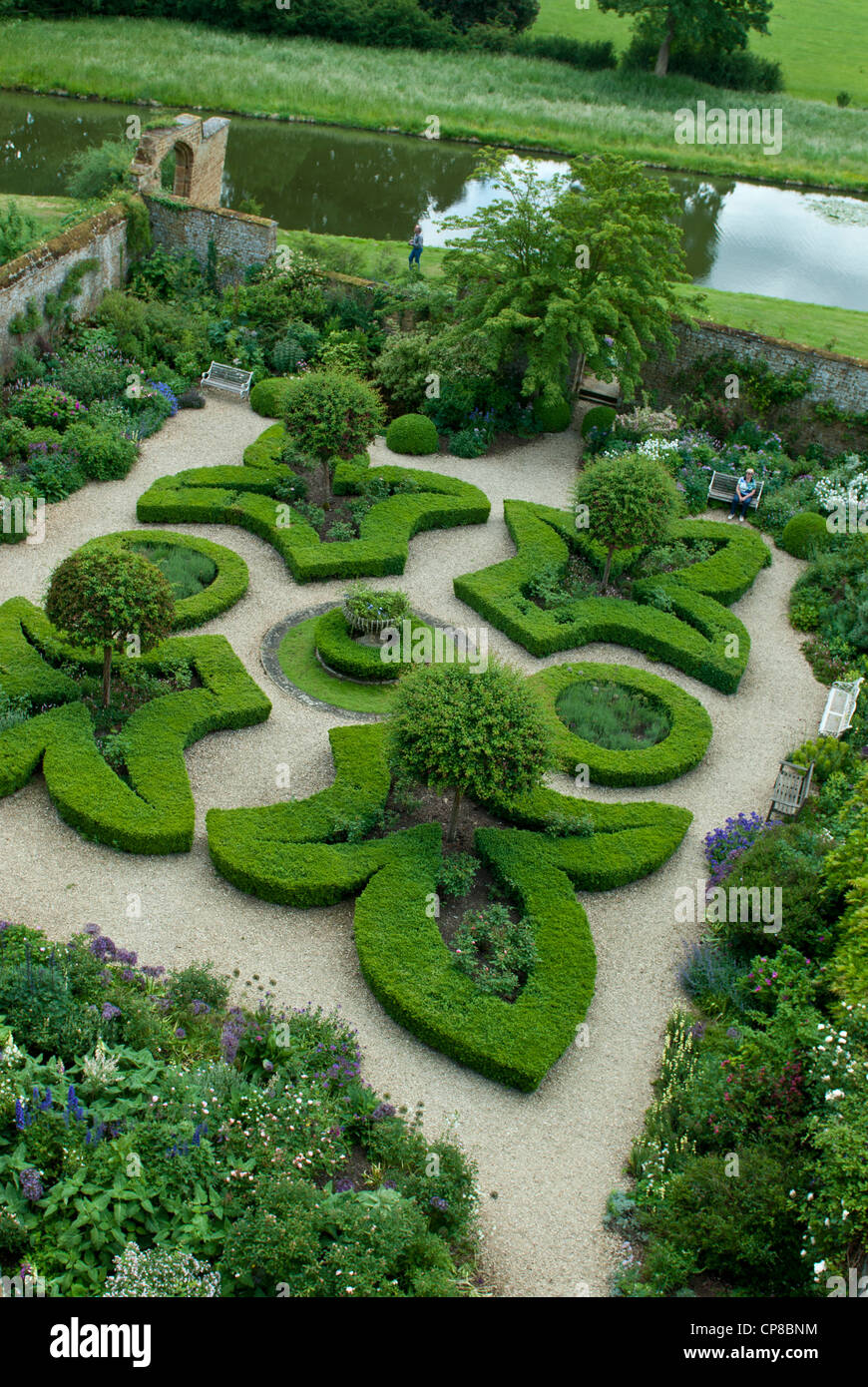 High viewpoint towards the Fleur de Lys gardens of Broughton Castle ...