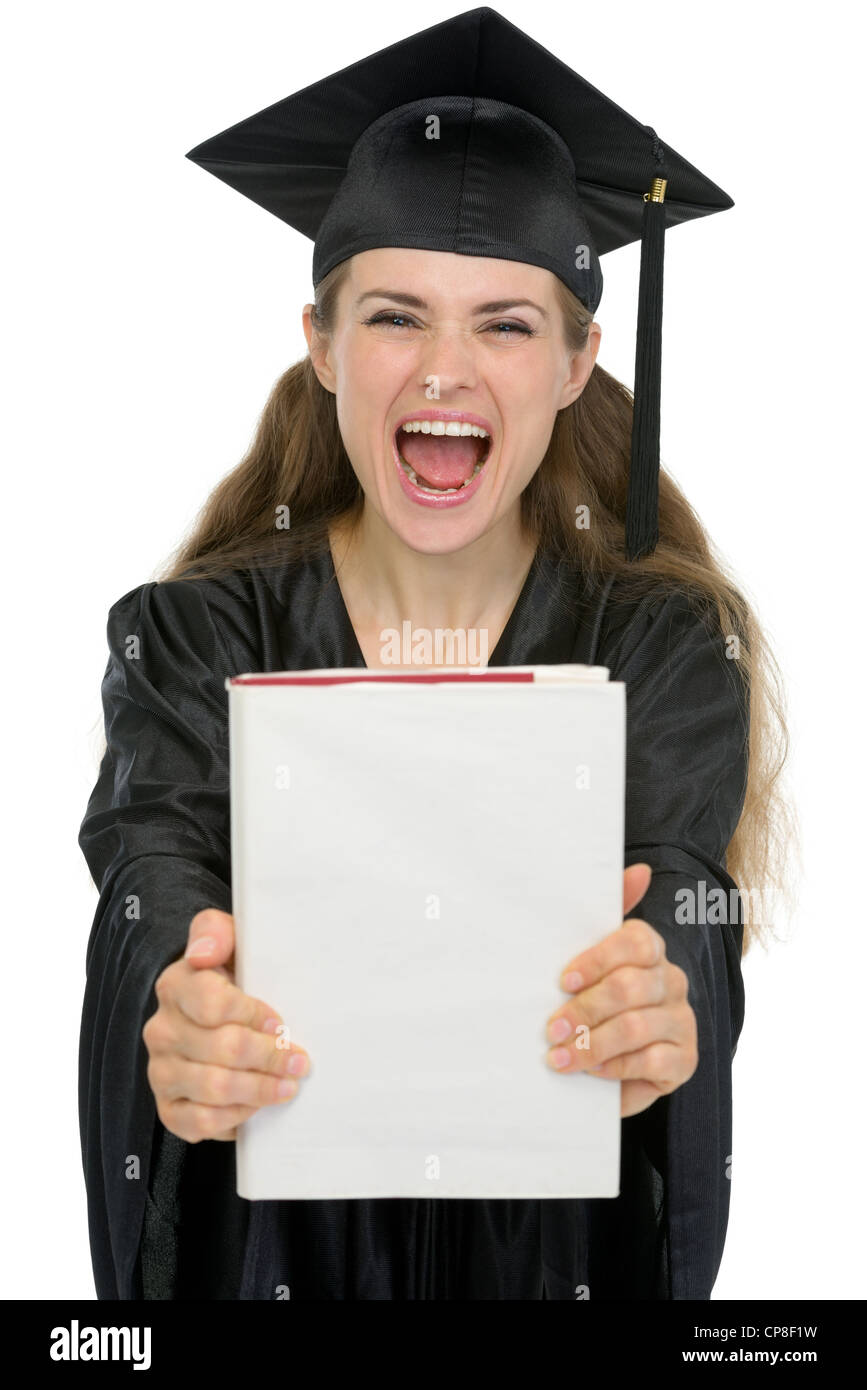 Excited graduation girl student showing book Stock Photo - Alamy