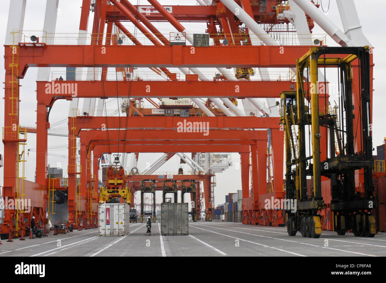 A container ship is loaded in the port of Yokohama, Japan Stock Photo ...