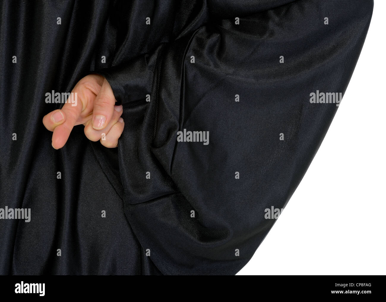 Close up on crossed fingers hidden behind back Stock Photo - Alamy