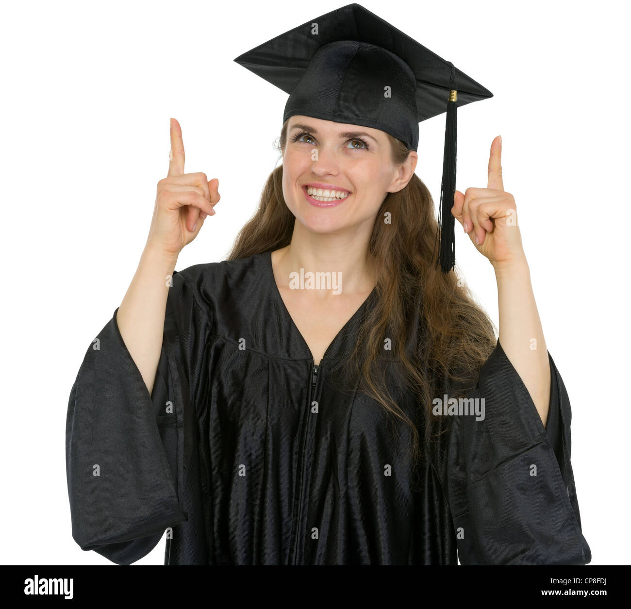 Happy graduation student girl pointing up Stock Photo - Alamy