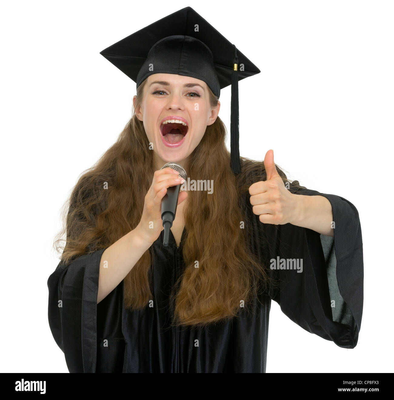 Excited graduation student girl speaking microphone and showing thumbs ...