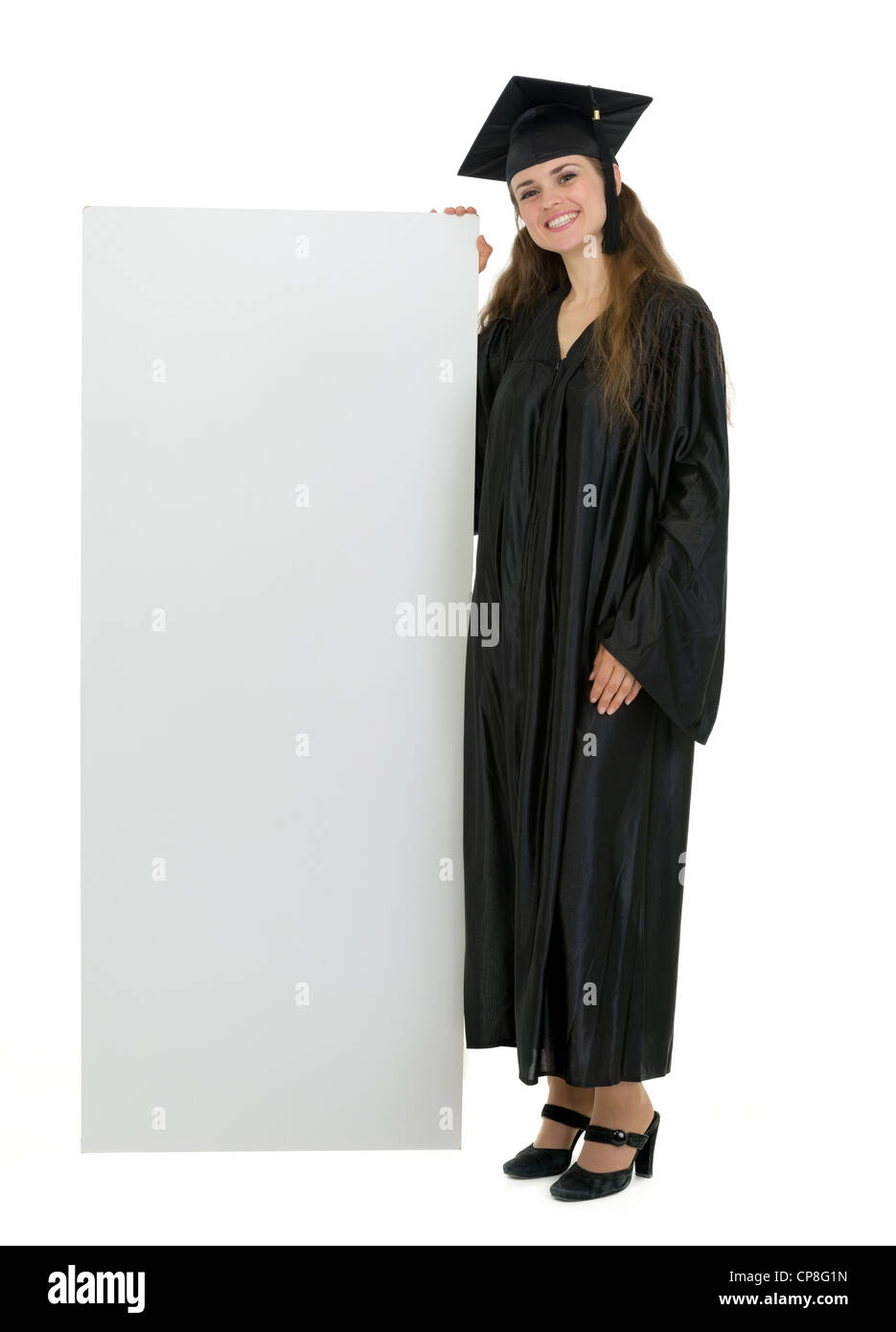 Full length portrait of happy graduation student holding blank ...