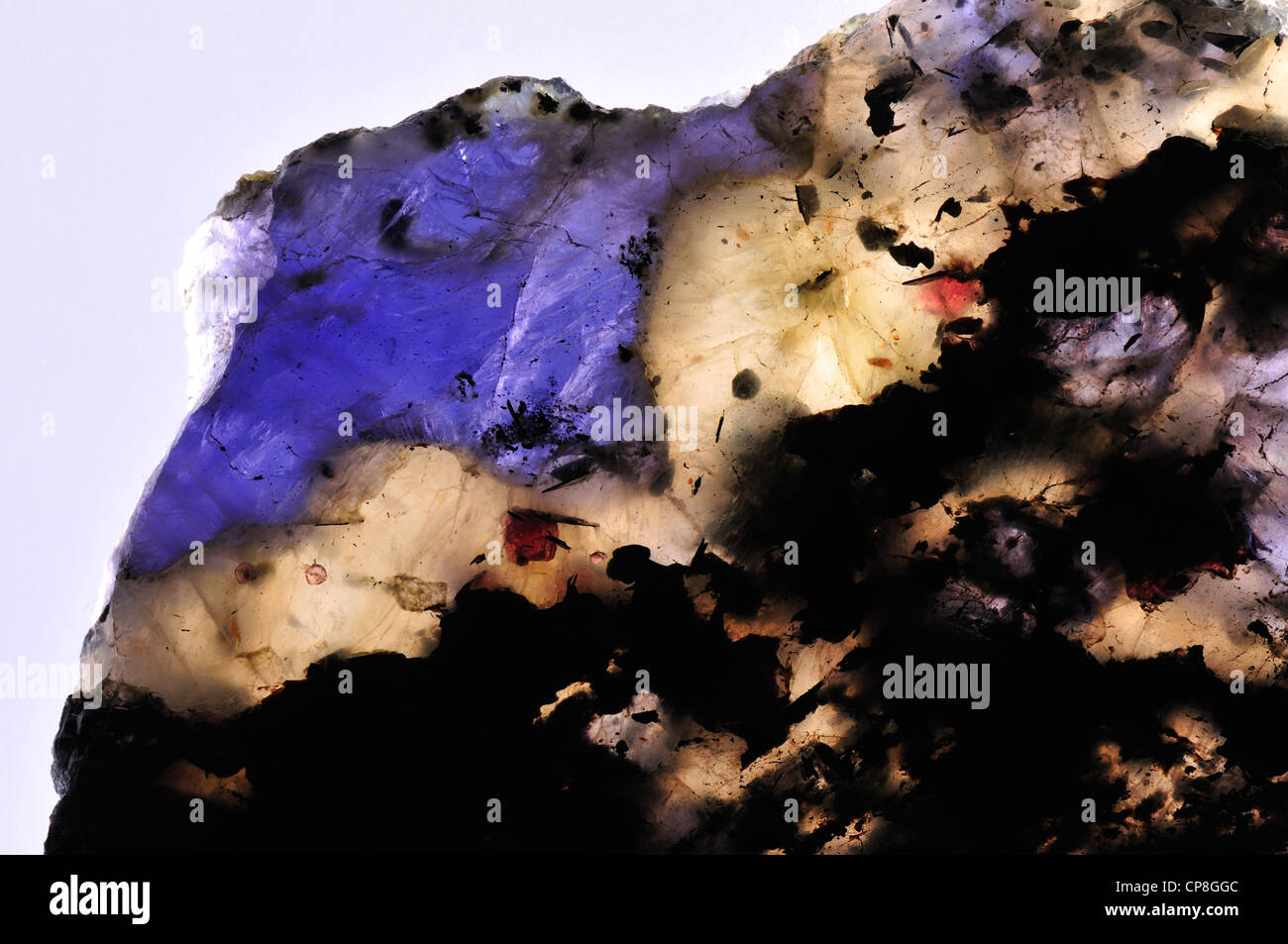 iolite / blue cordierite crystals, backlit Stock Photo - Alamy